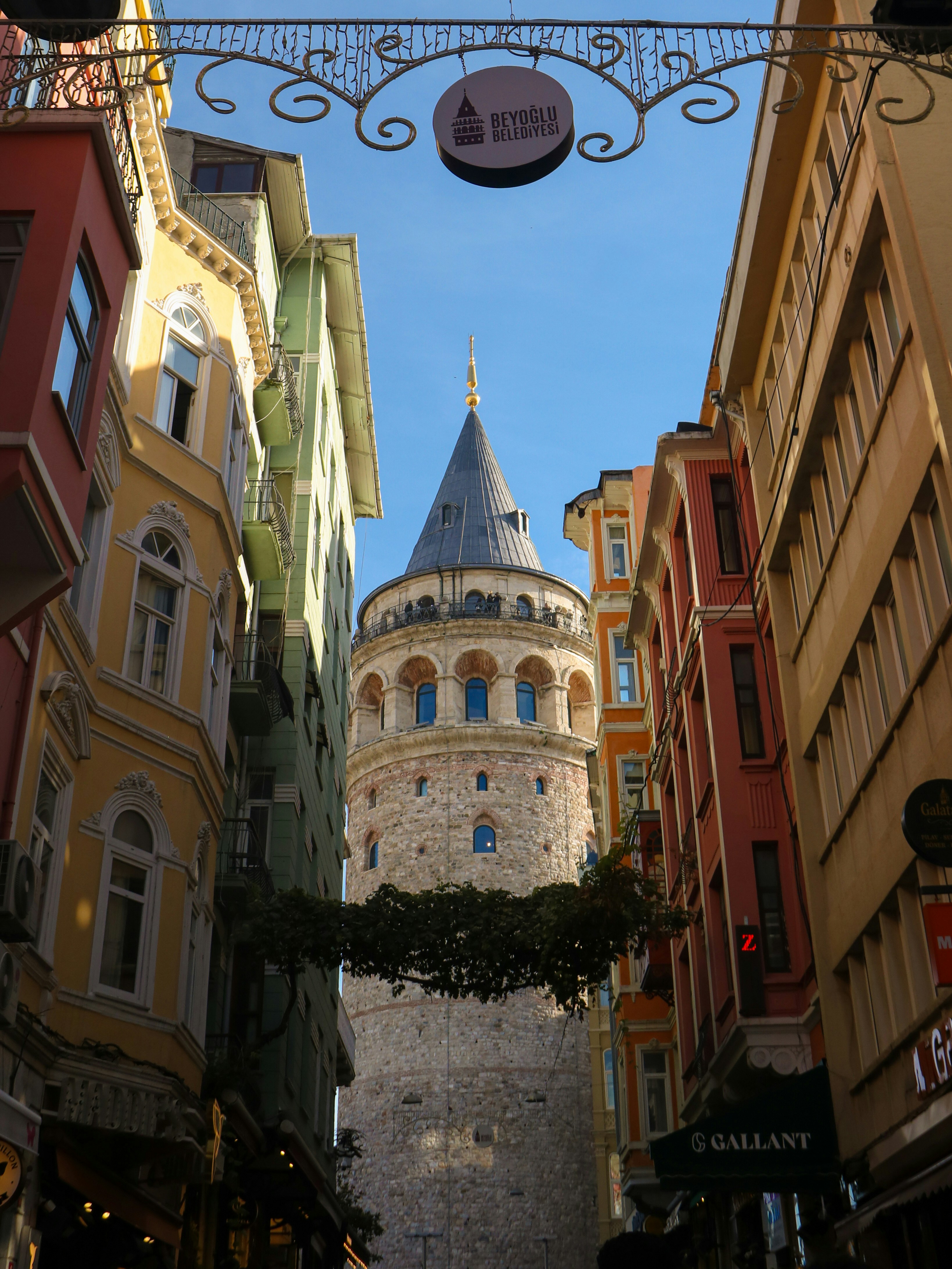 Galata Gate: Clocking the Tower Amid a Colorful Başn Street
