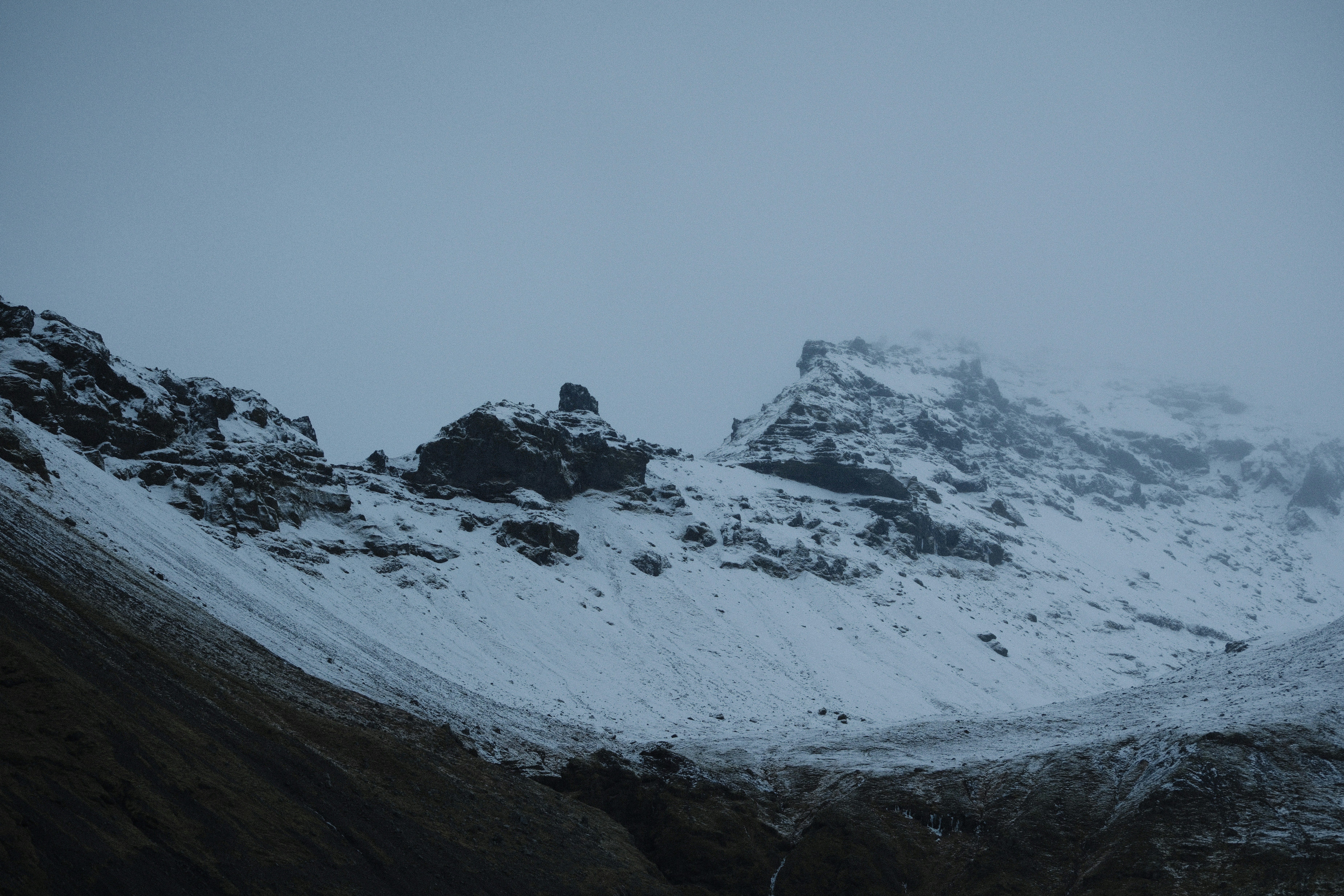 View over snowy mountains from the glacier.