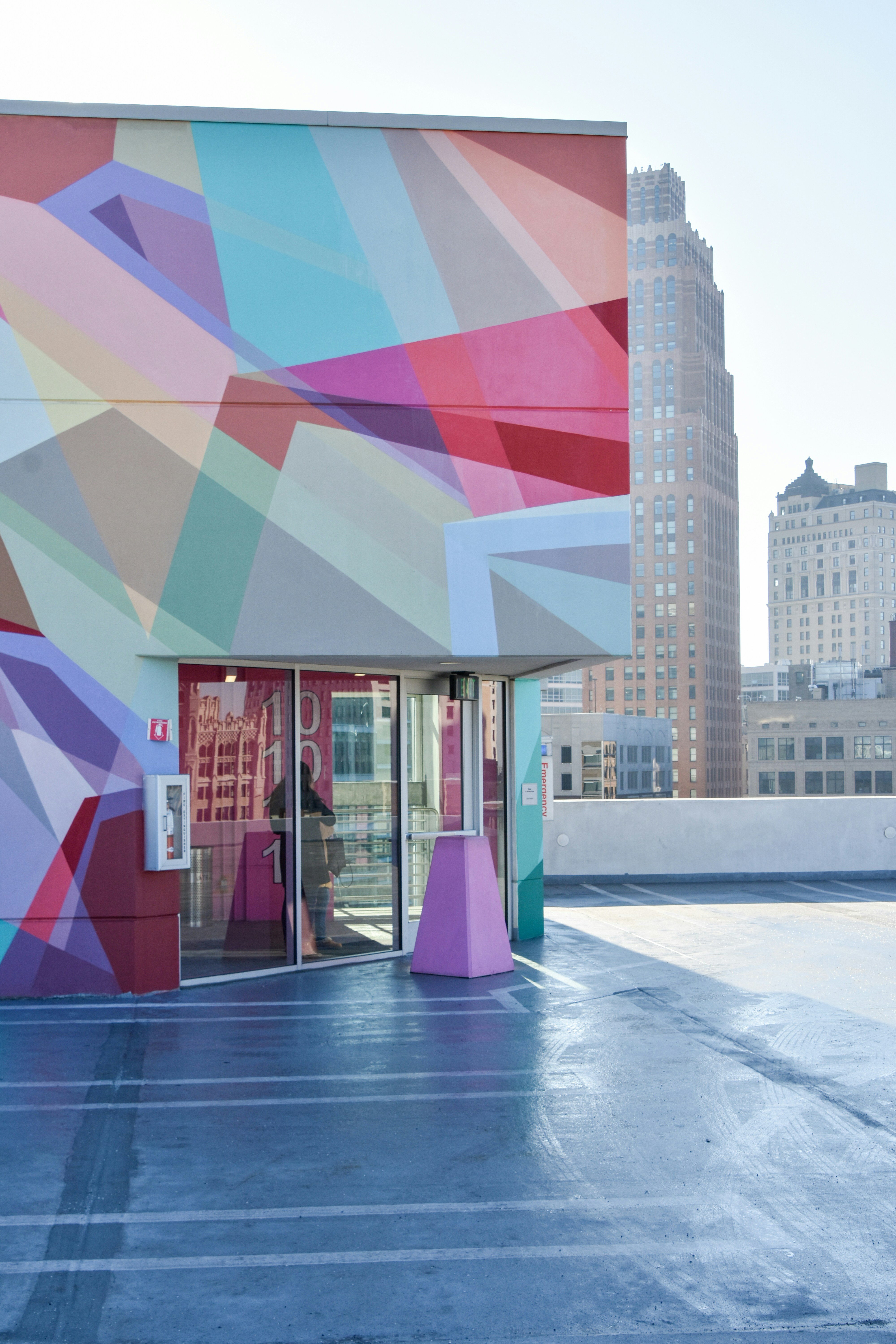 Colorful Urban Facade: Geometric Mosaics Meet Rooftop Perspective
