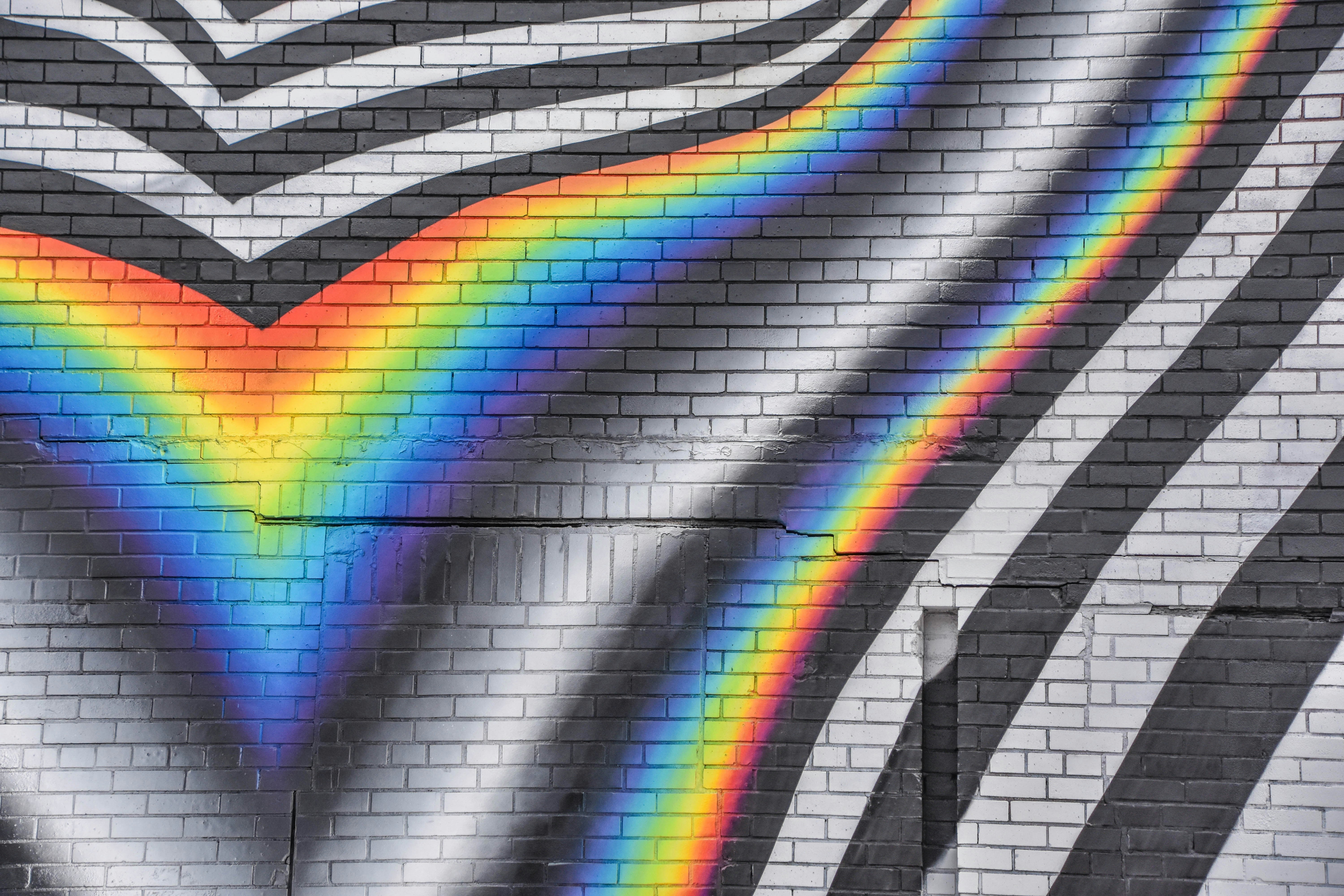 Rainbow light reflection on brick wall with zebra stripesThe Quiet Atlas