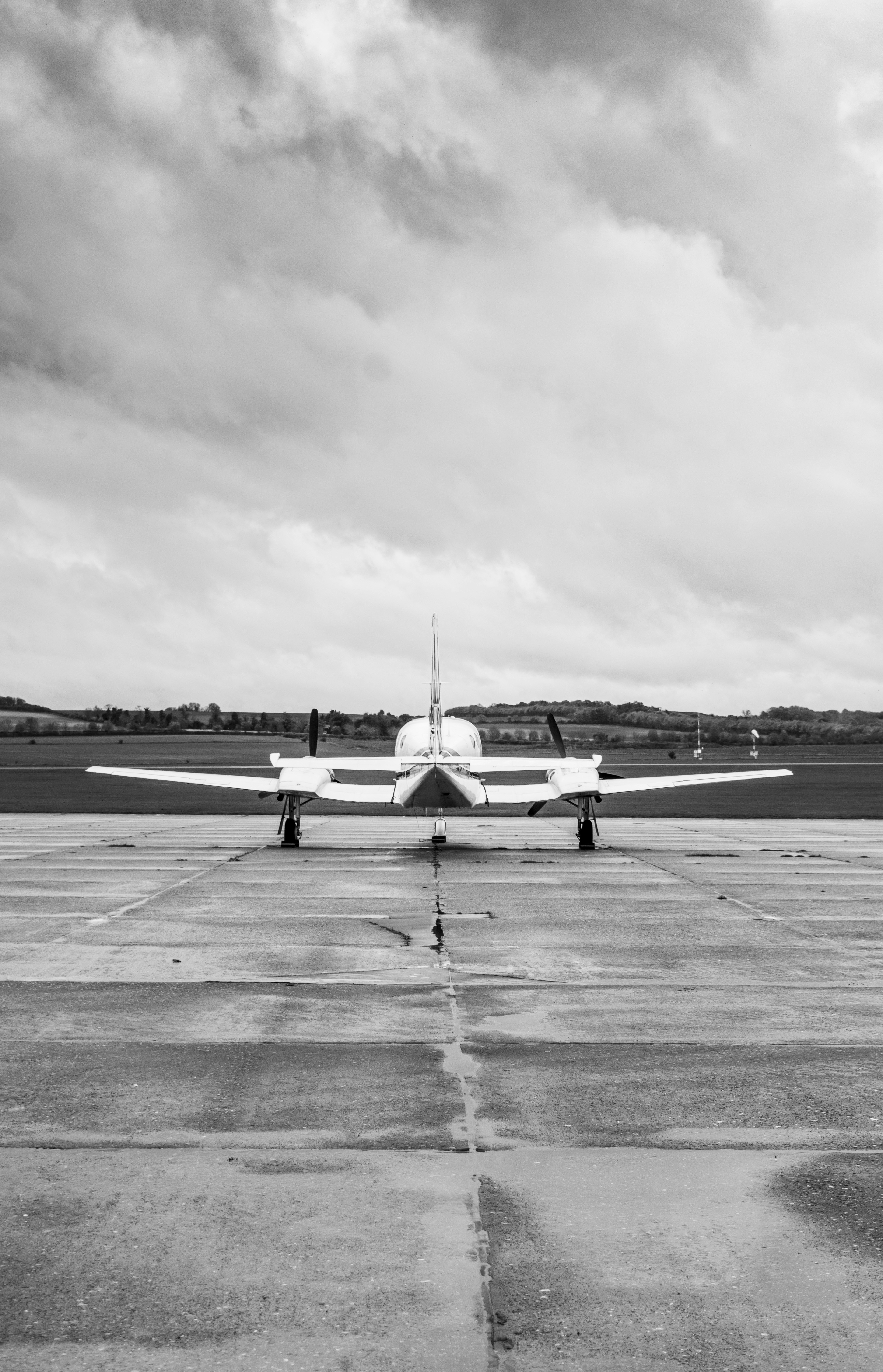 Rear View of a Simple Runway Aircraft on a Tarmac