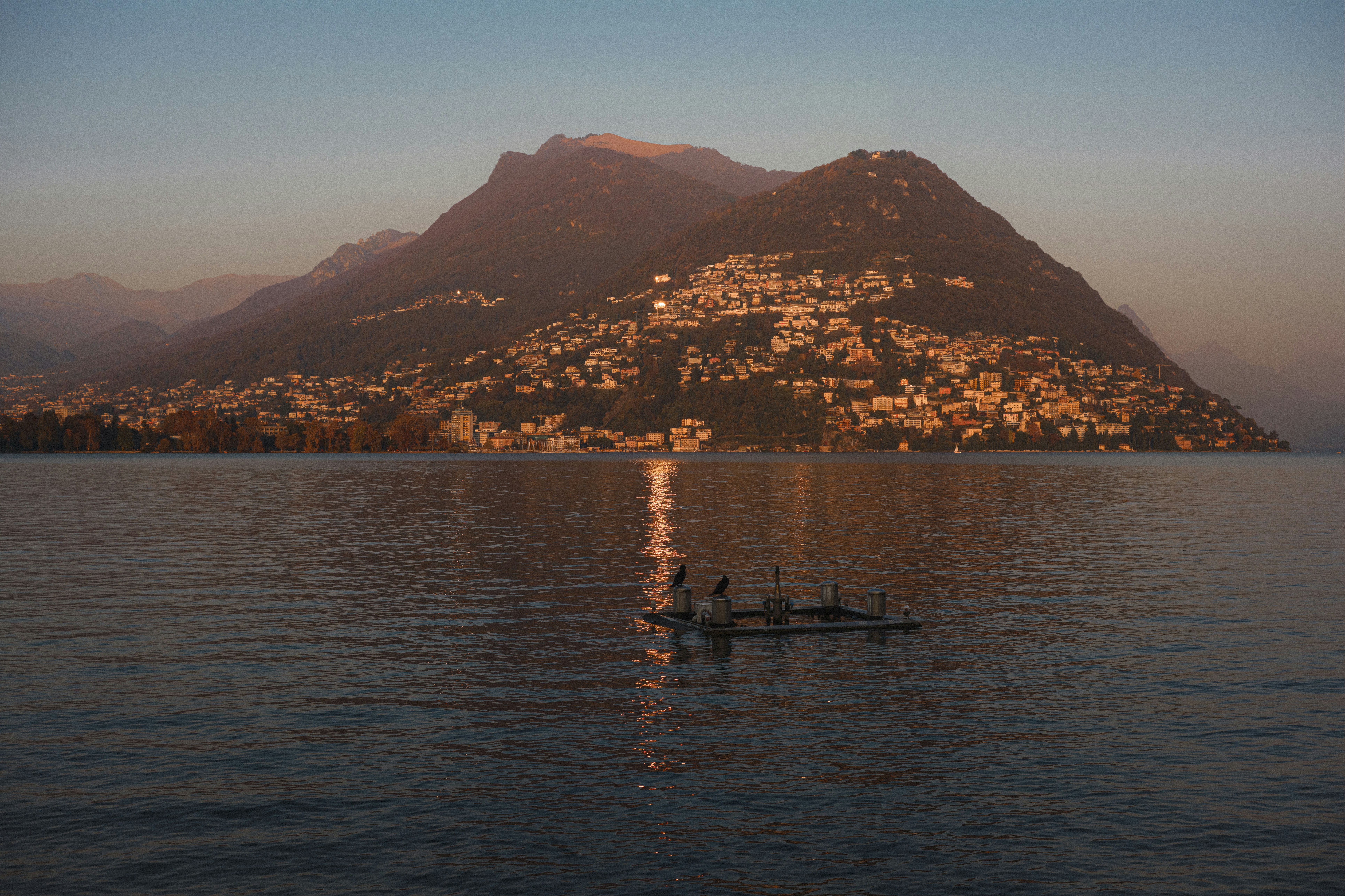 Island Rising from the Sea: Village Lights on the Mountain