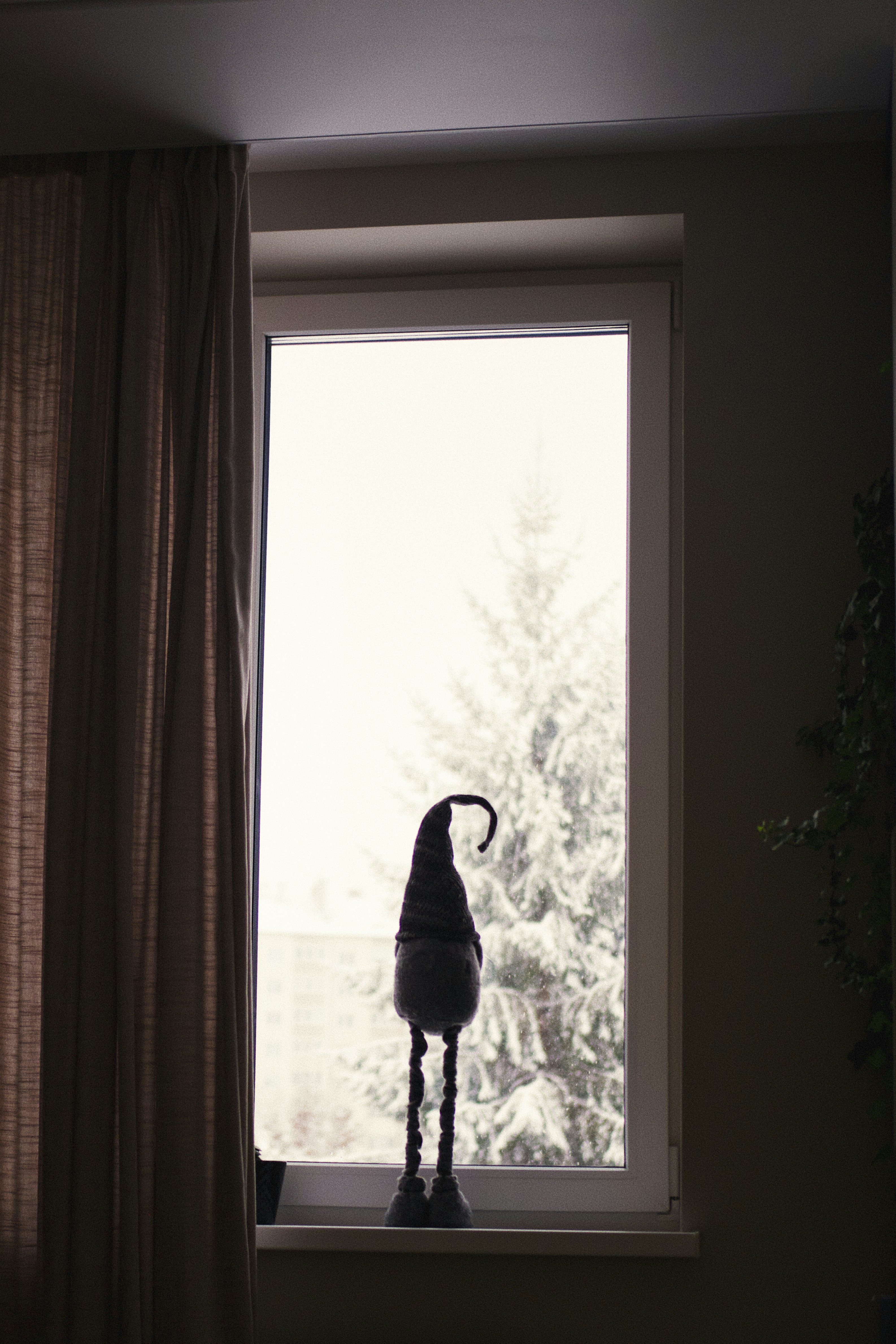Sculpted Wisp Staring Out the Window