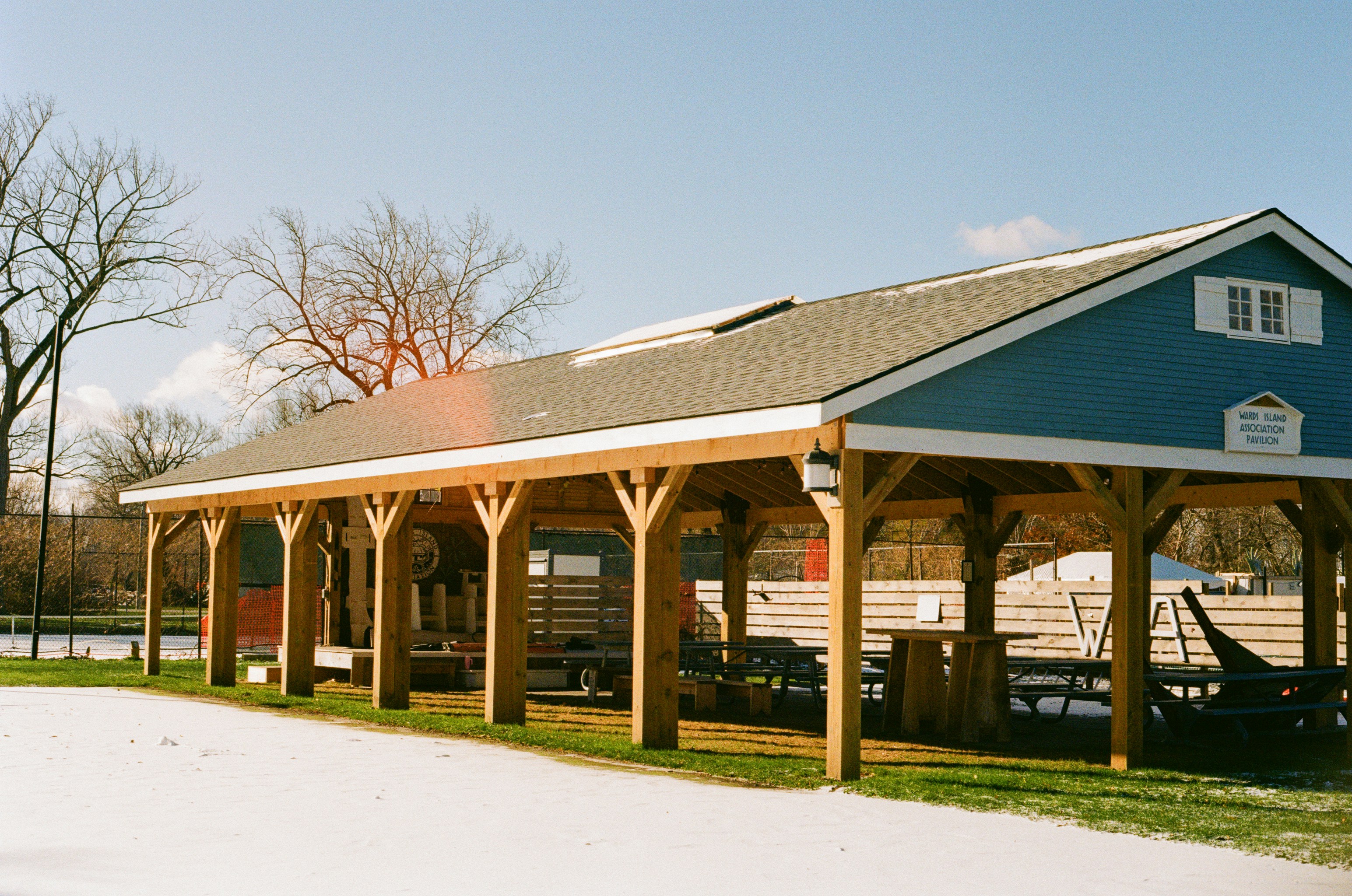 Blue building with open wooden porch on sunny day photo – Free Winter ...