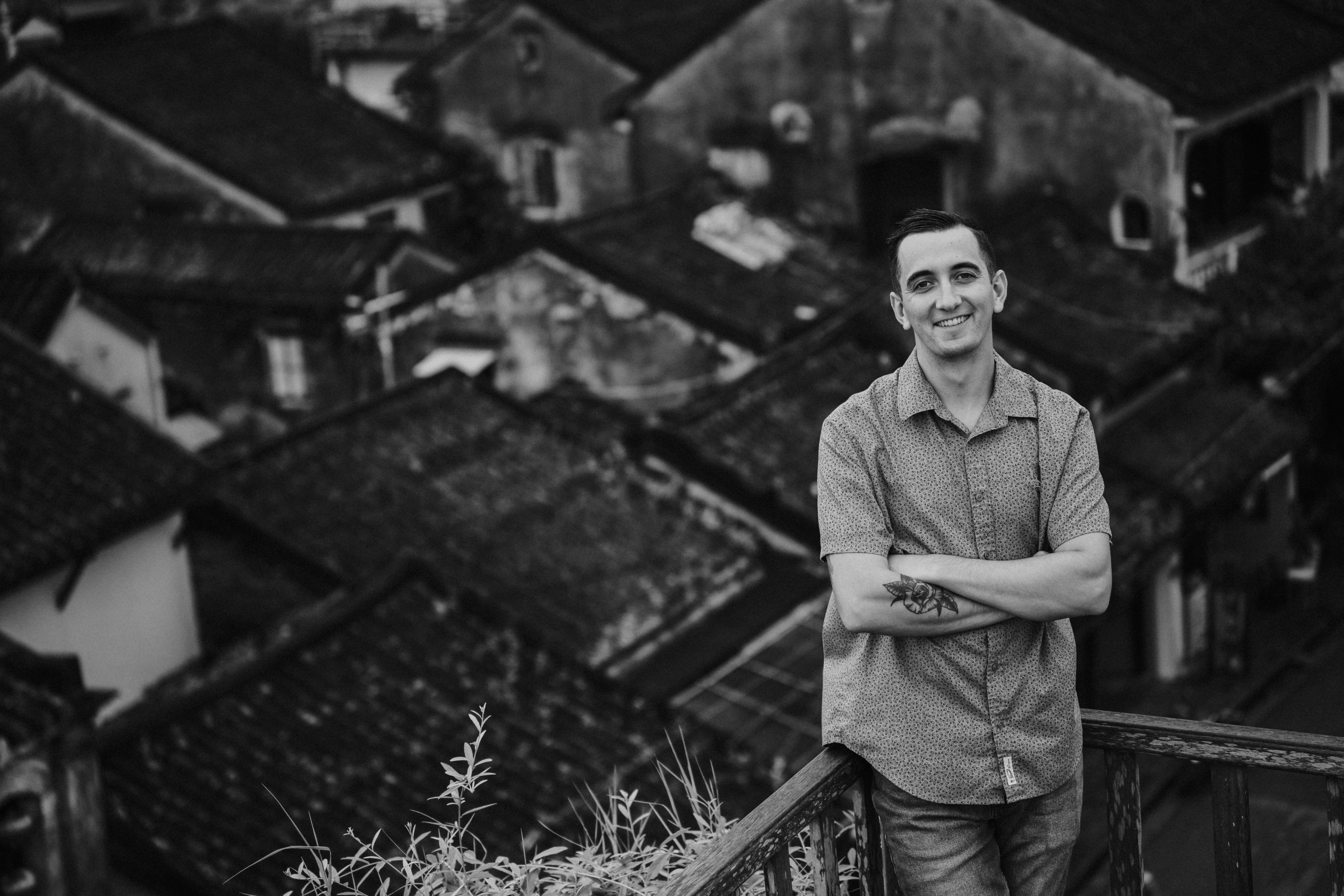 Smiling Portrait on a Rooftop Overlook