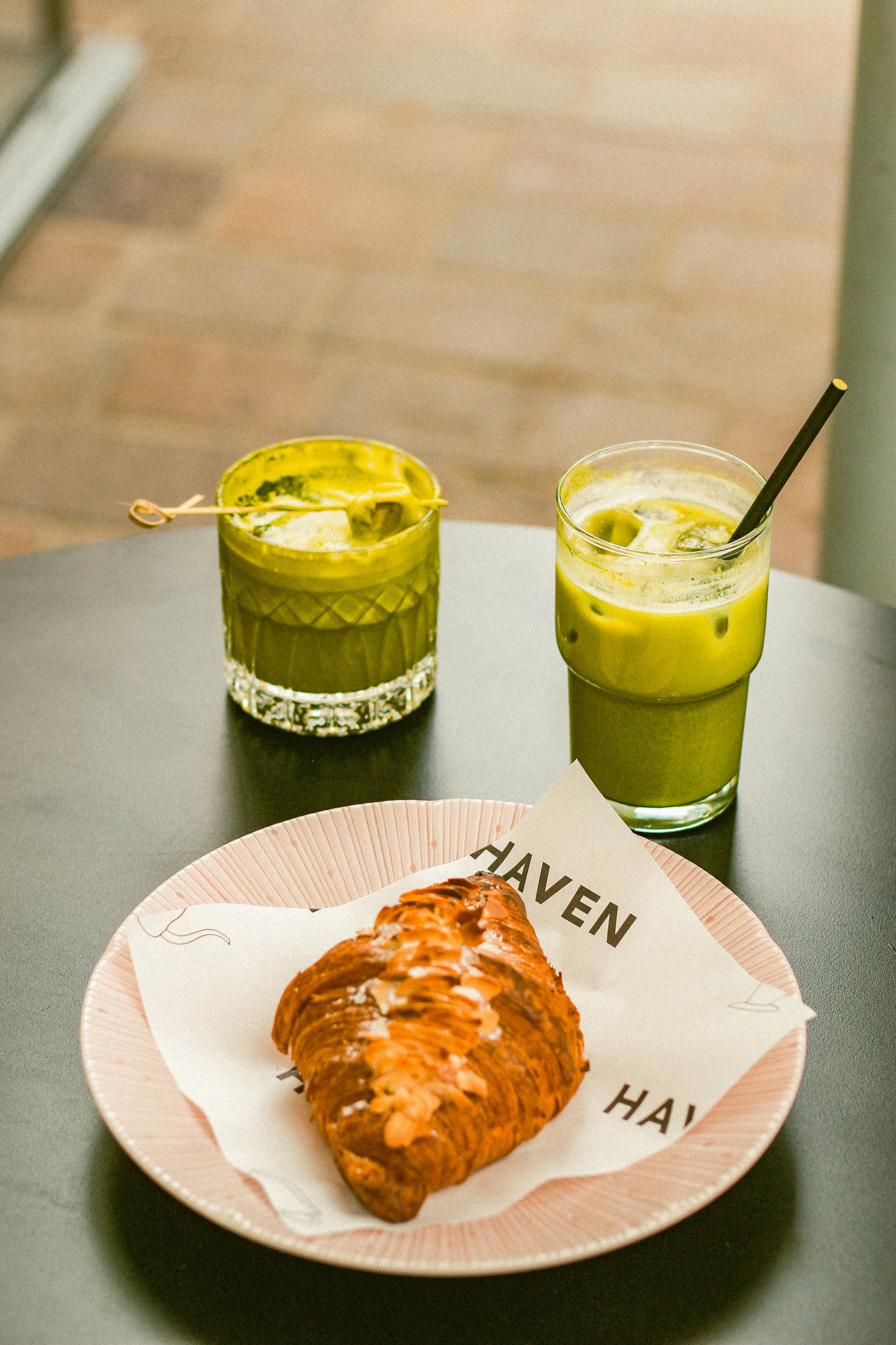 Pastry and Iced Elixirs on a Quiet Café Table