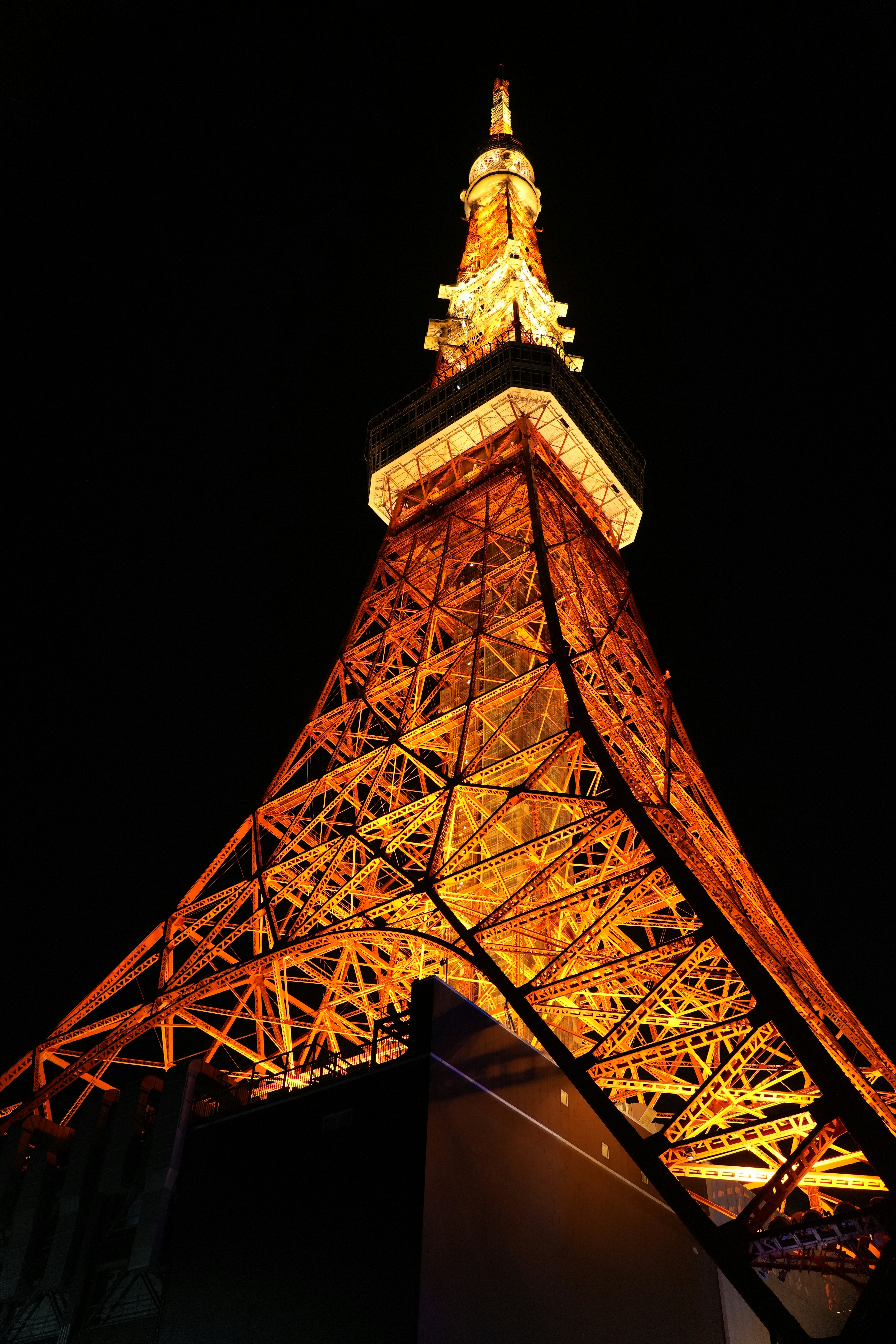 The iconic Tokyo Tower illuminated at night. Japan.