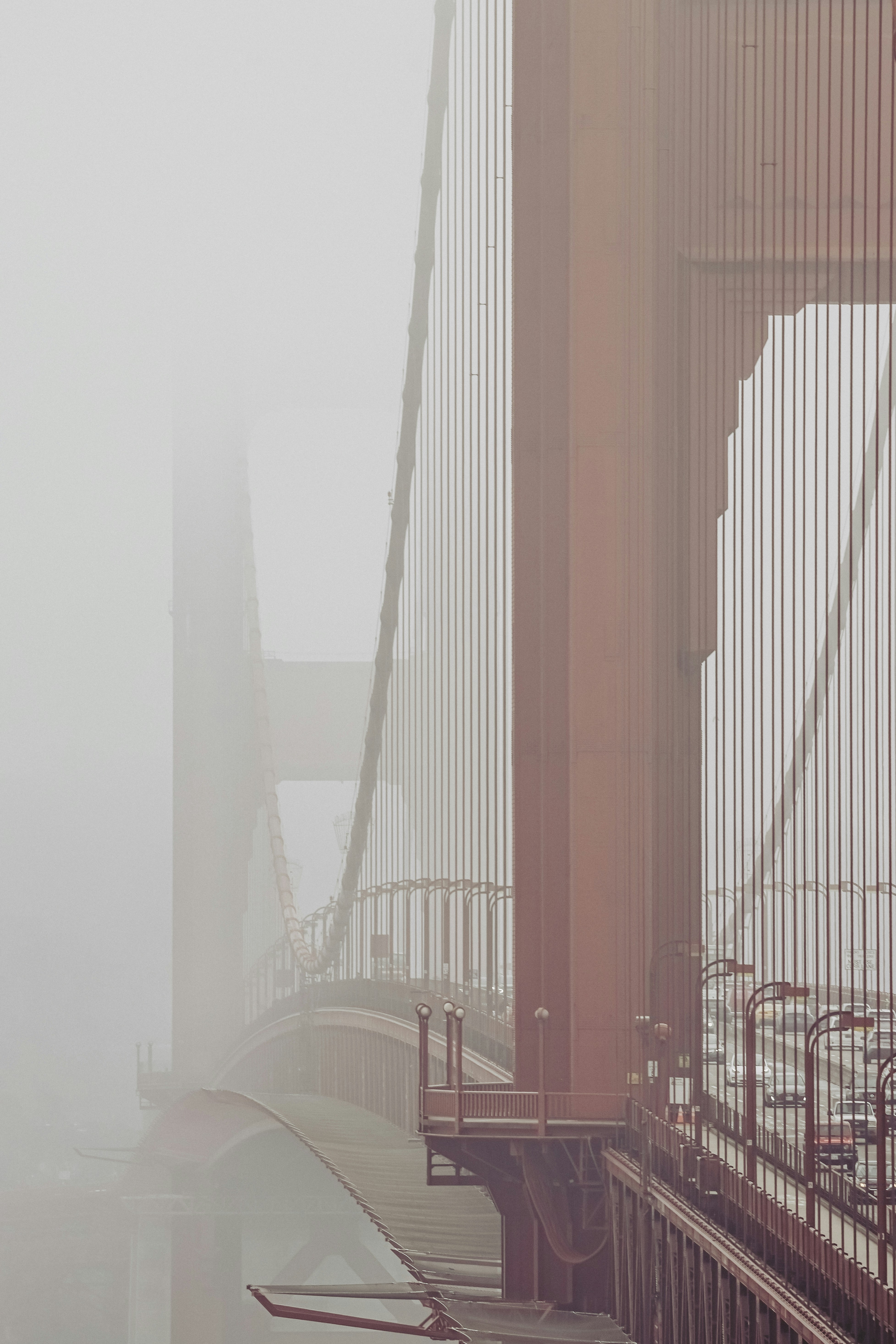 Suspended in Fog: A Soft Silhouette on a Golden Gate Pier