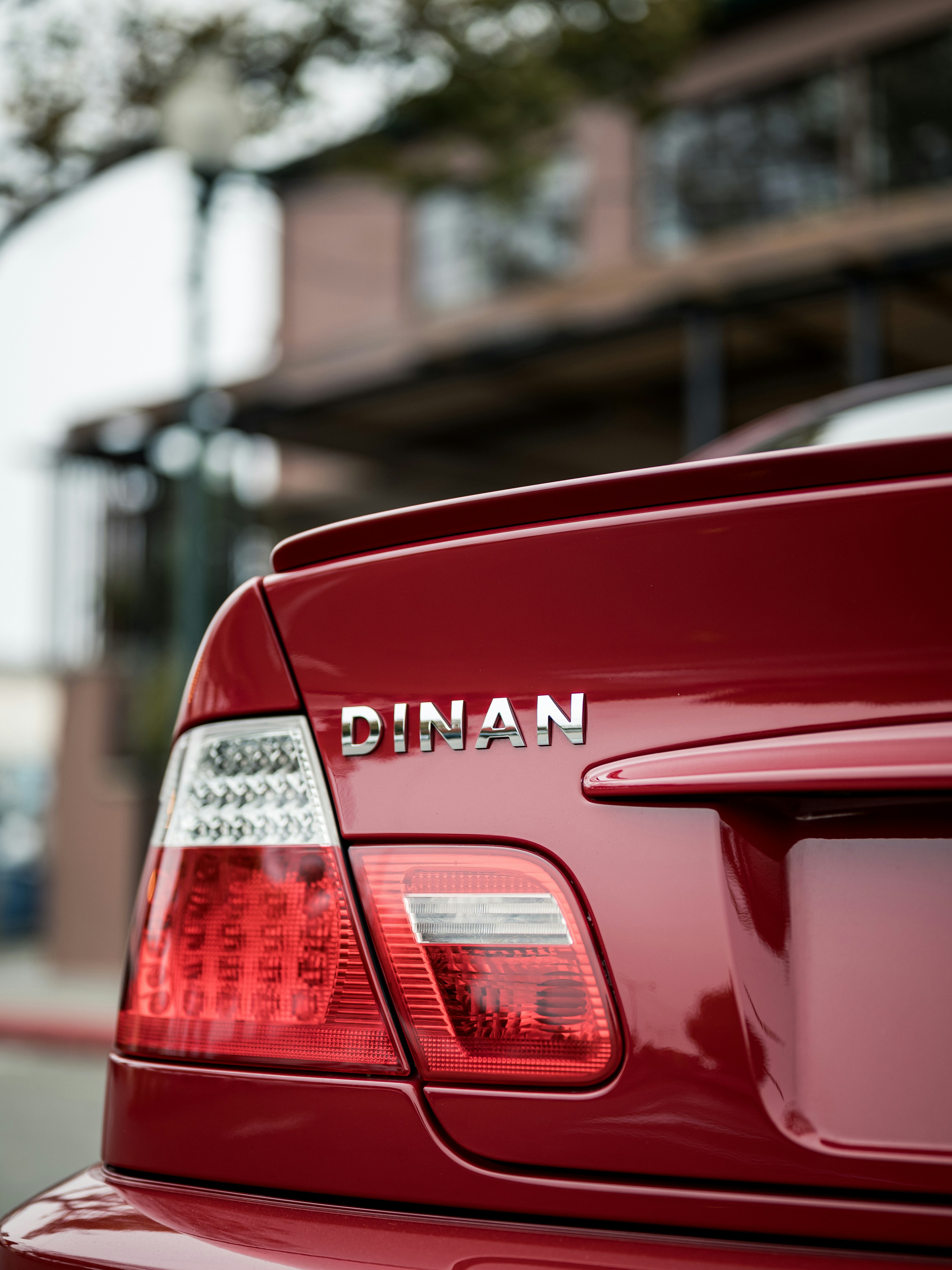 A Dinan modified Imola Red BMW E46 M3 photographed at Cars and Coffee Berkeley.