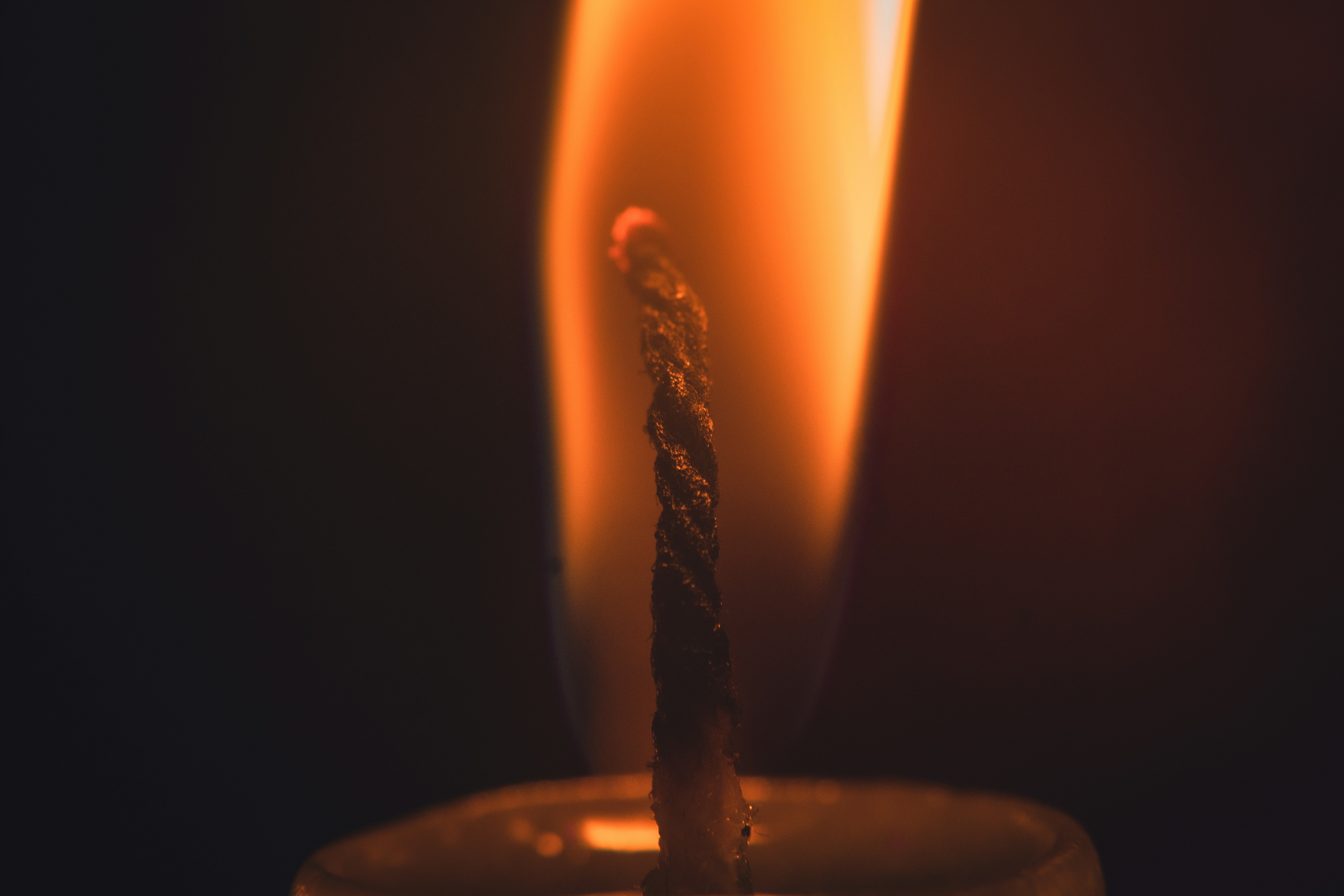 Single Candle Flame: Quiet Burn Against Darkness