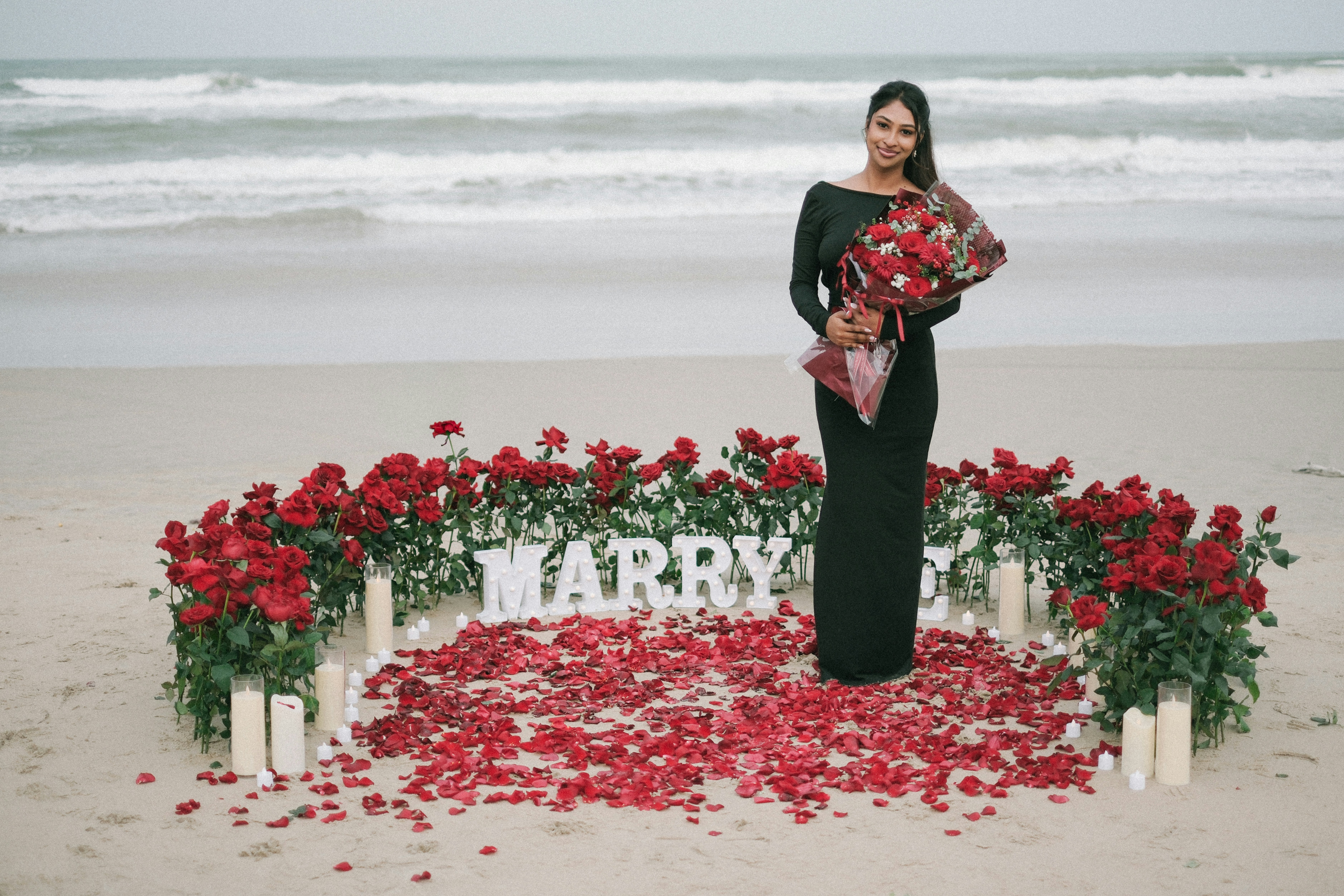 Bouquet of Roses on Sand: A Silent Celebration by the Sea