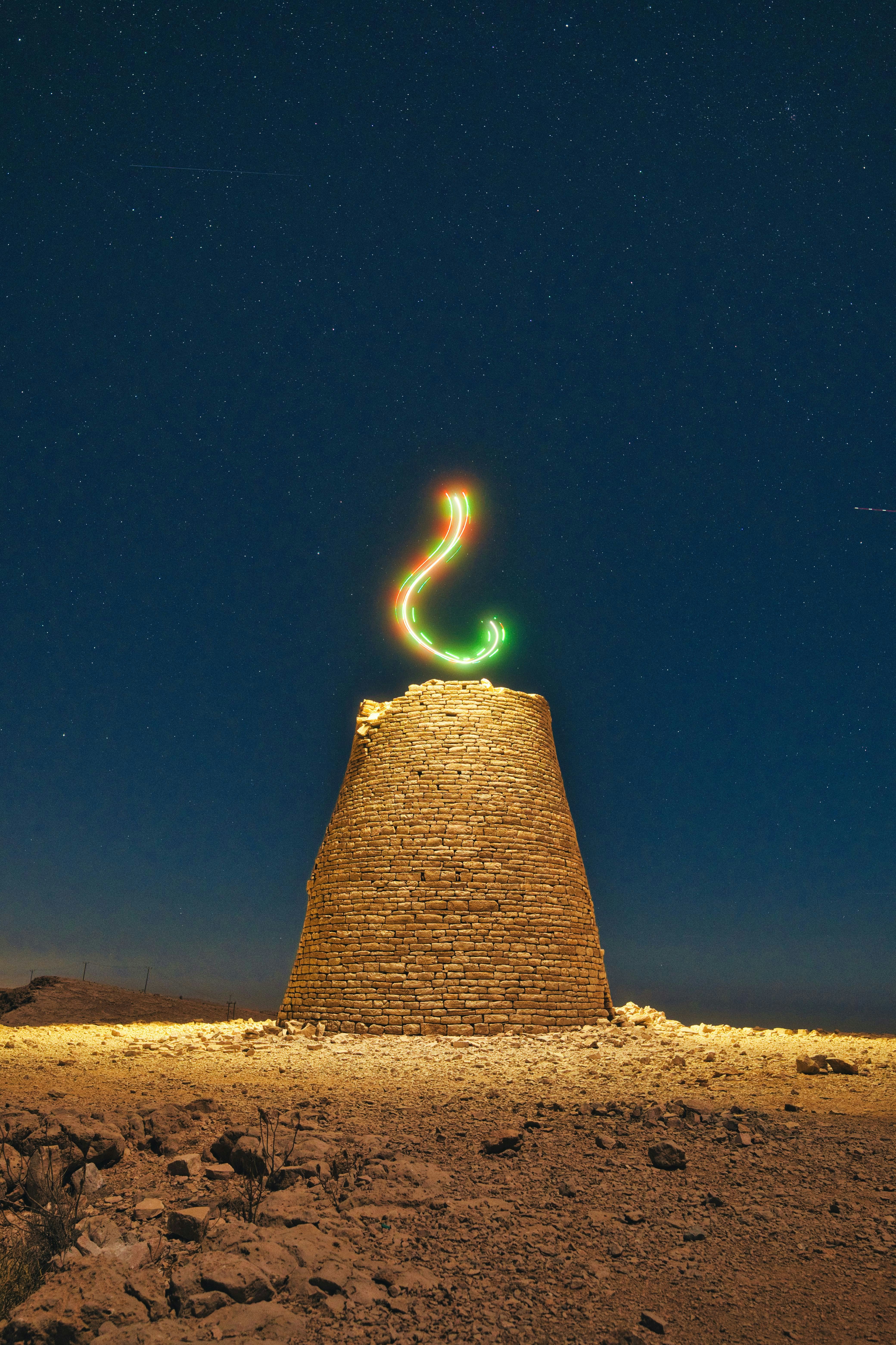 Luminous Spiral atop an Ancient Kiln under a Starry Night
