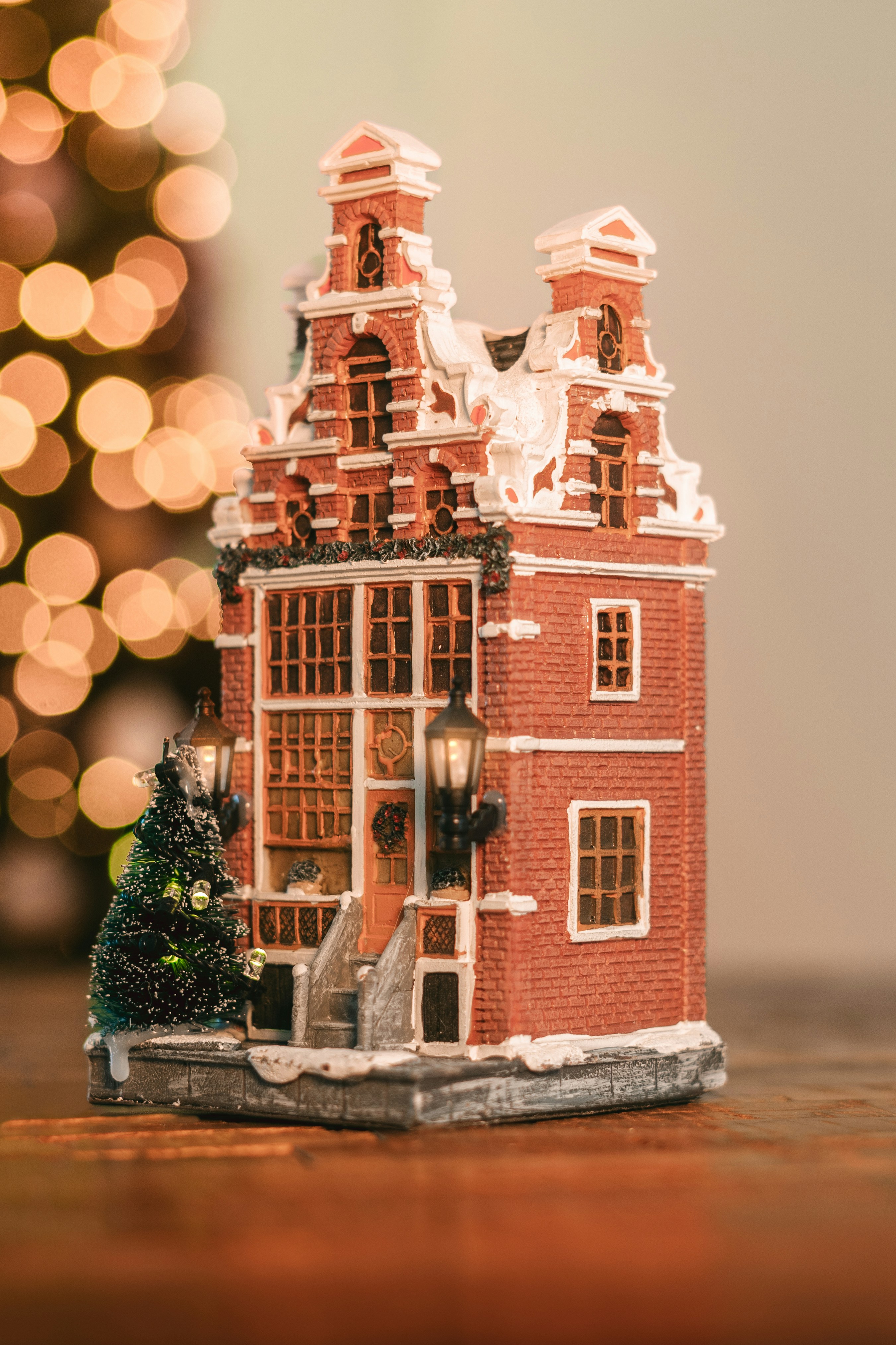 Miniature Winter House with Soft Holiday Bokeh
