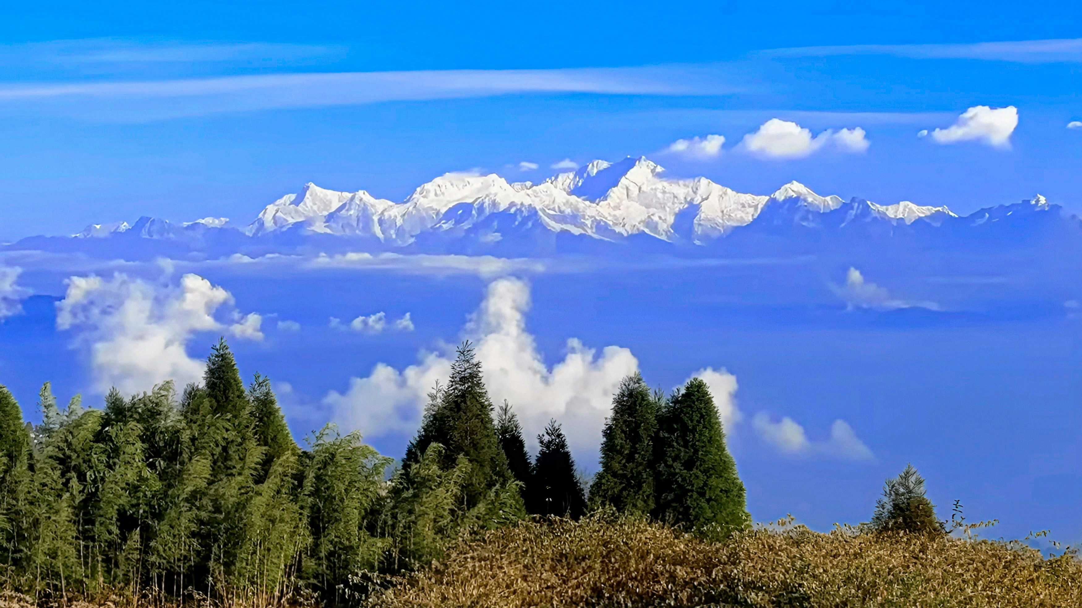 Snowbound Ridge Above a Sea of Clouds