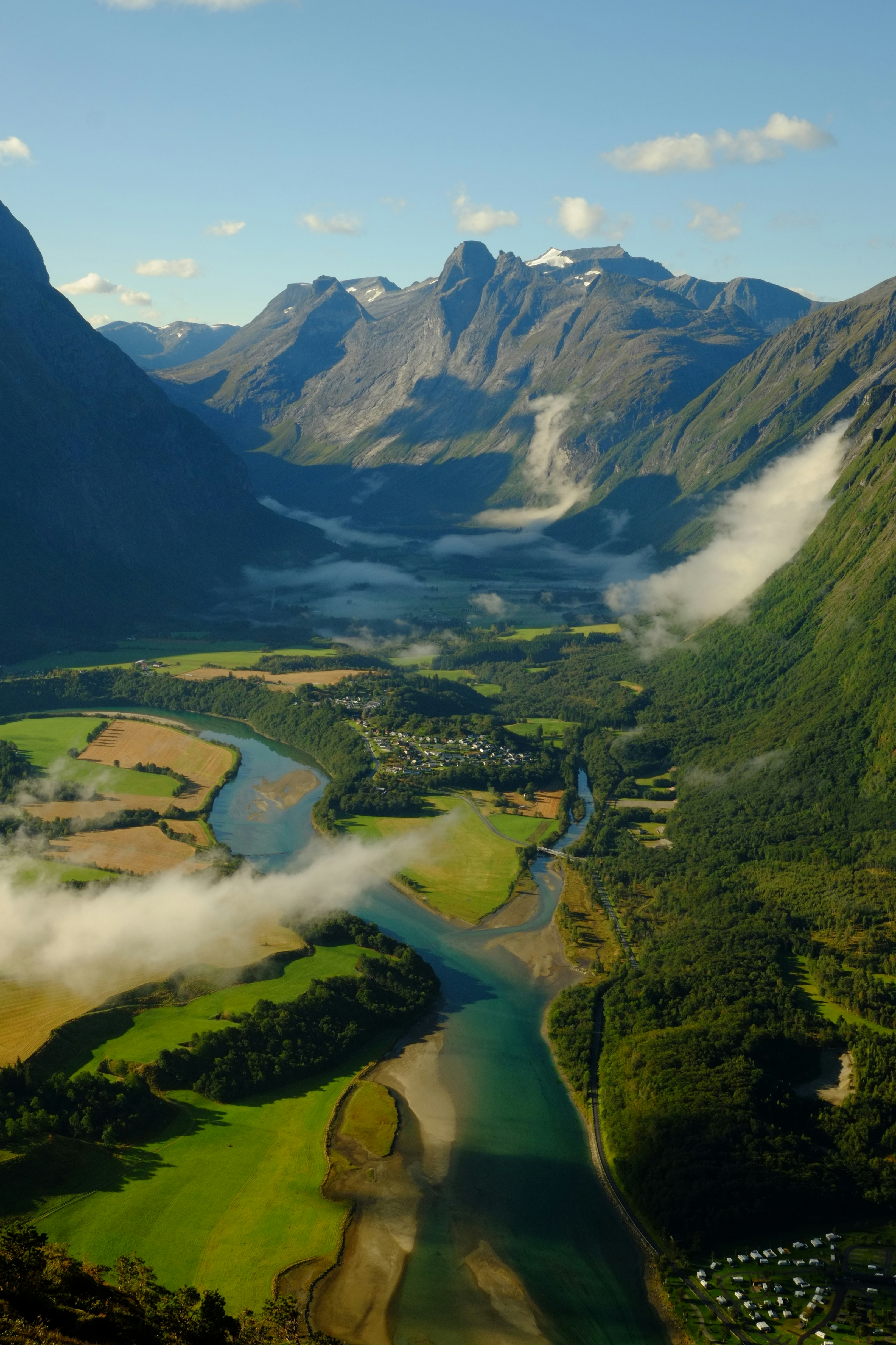Valley Ribbon: A Mountain Gorge Woven with River and Mist