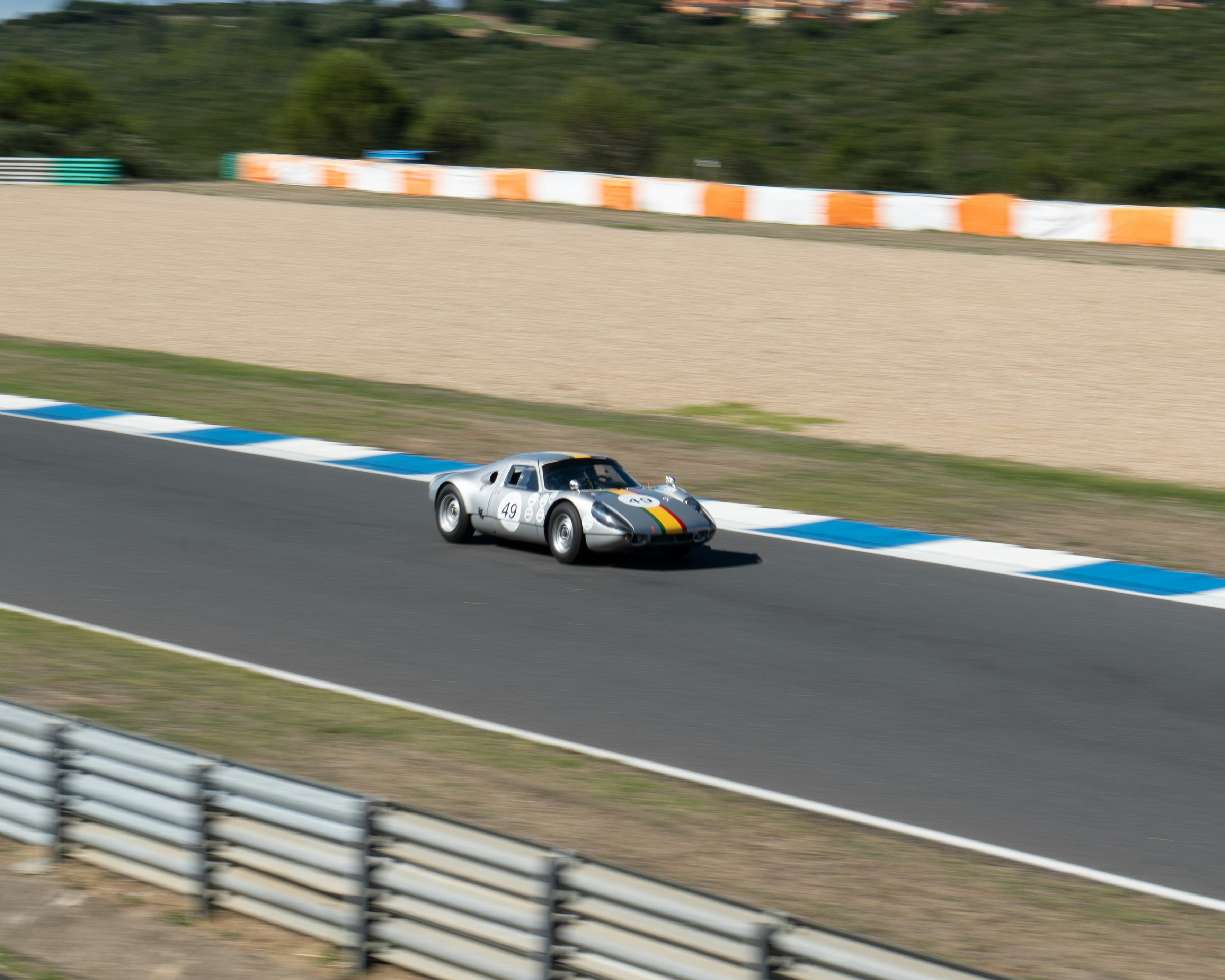 Silver vintage race car speeding on track. photo – Free Sports car ...