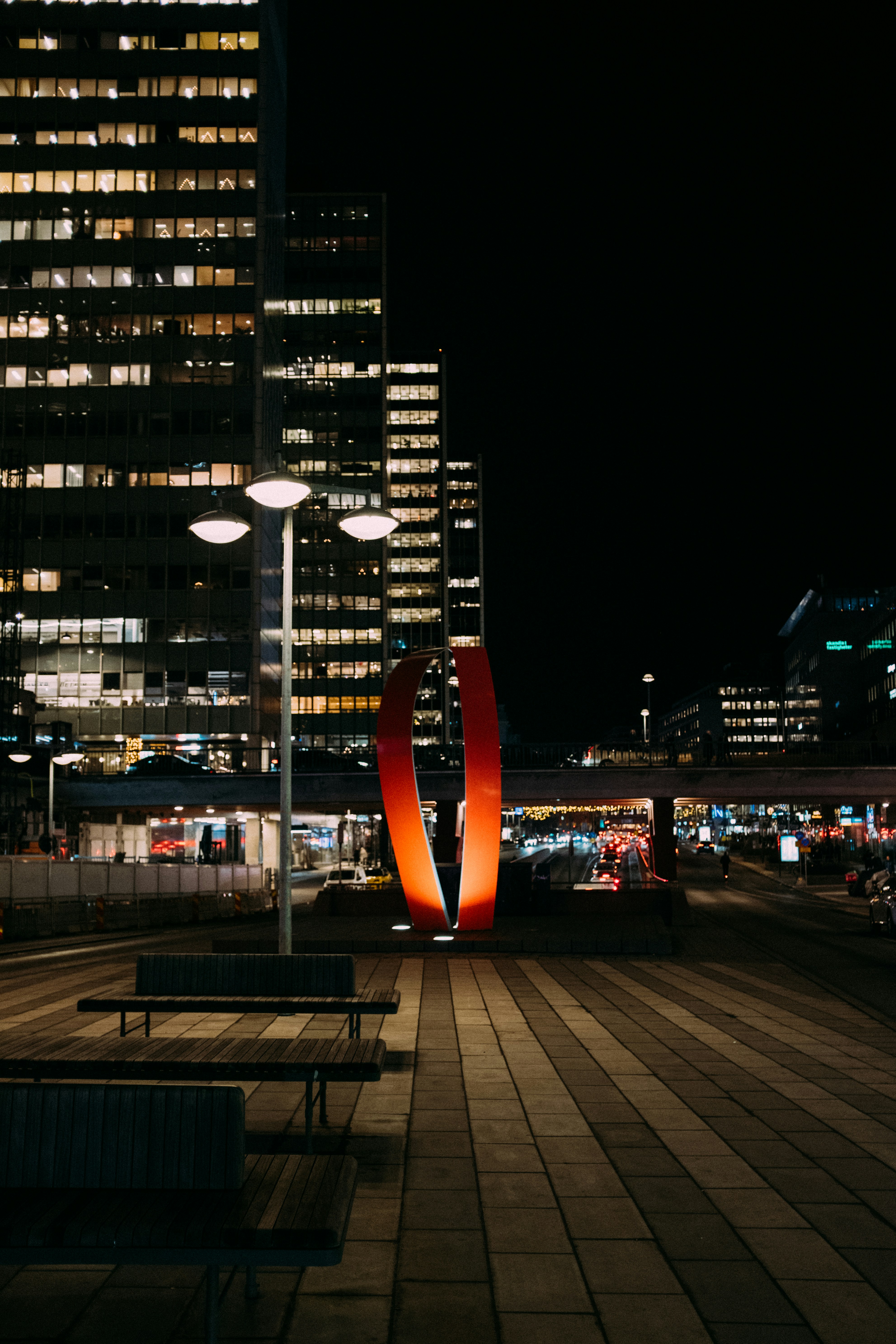 Red Sculptural Arc Nurturing Night Traffic