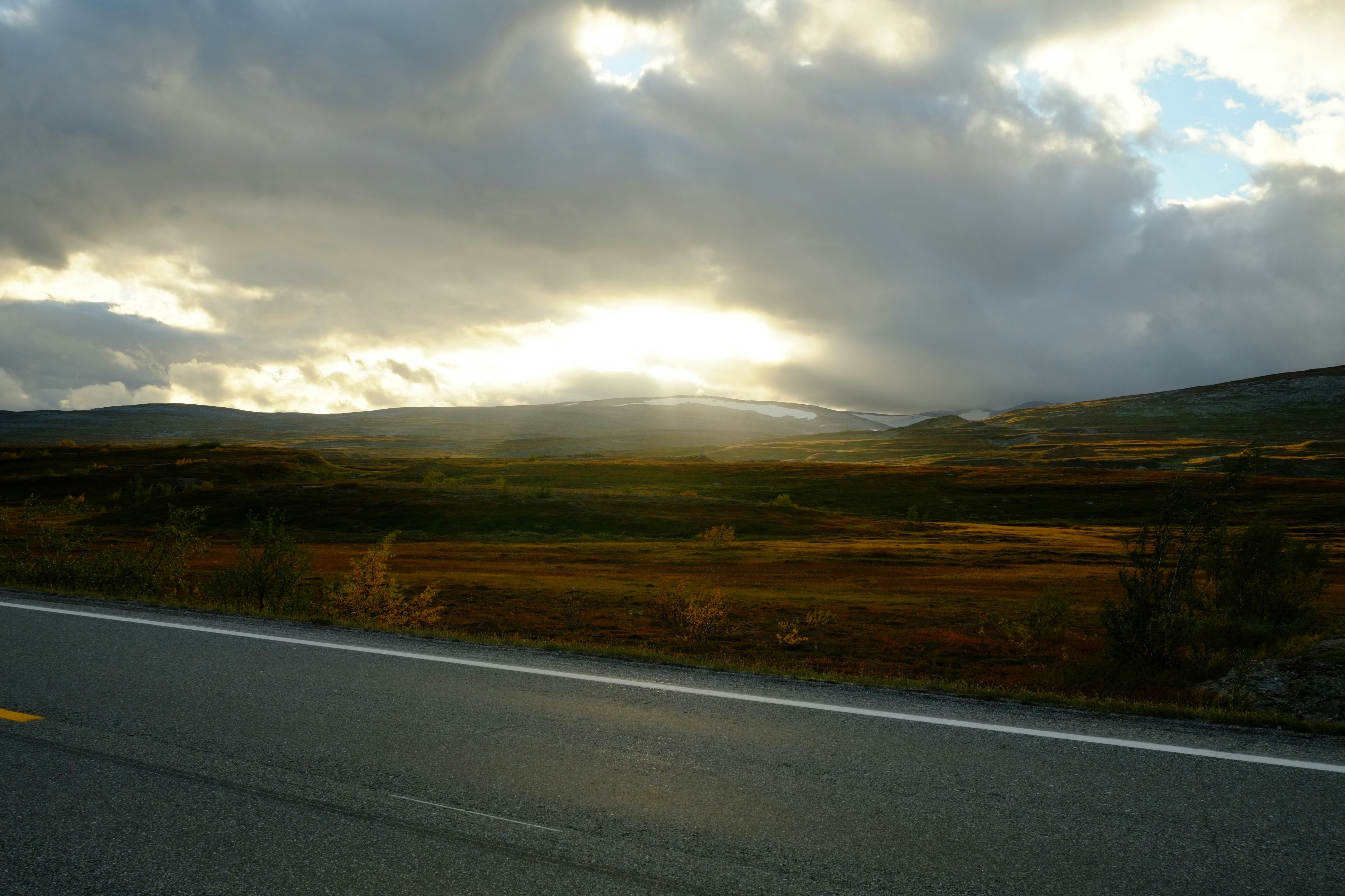 Low Sunbreak Over Prairie Roads at Quiet Dusk