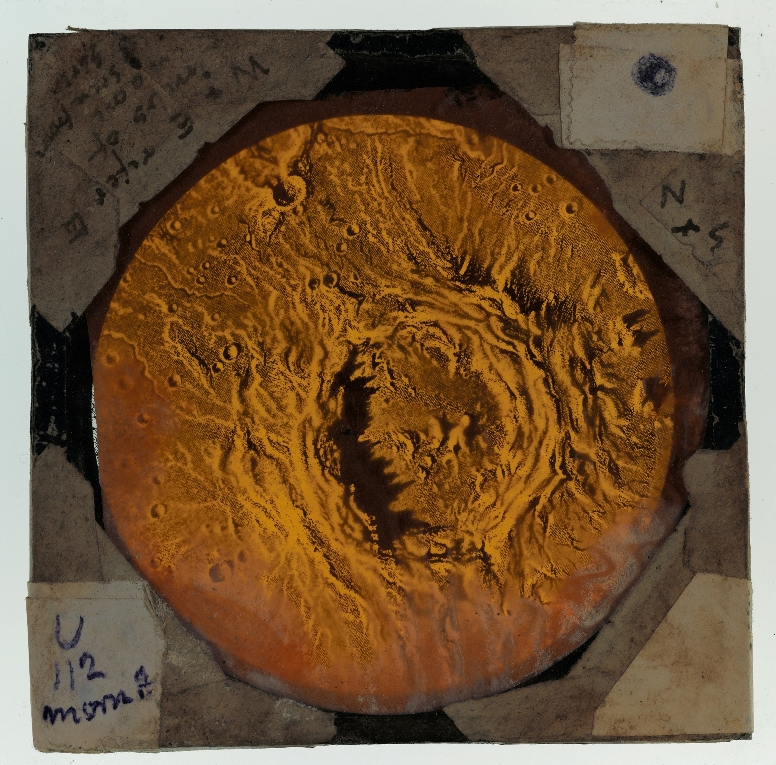 Orb of Fire: A Mineral Core in a Patinated Mount