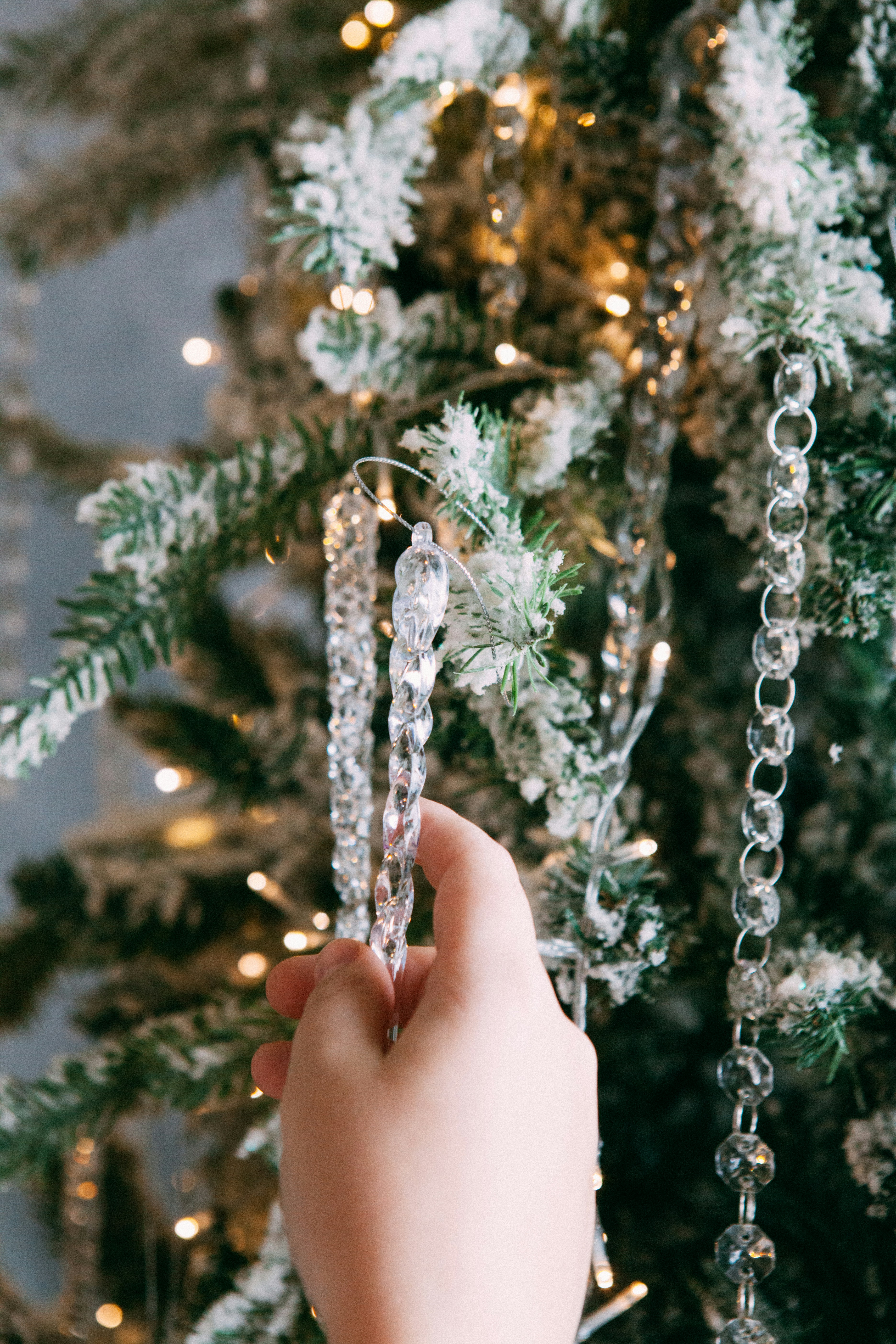 Glittering Icicles and Frosted Lights on a Holiday Tree