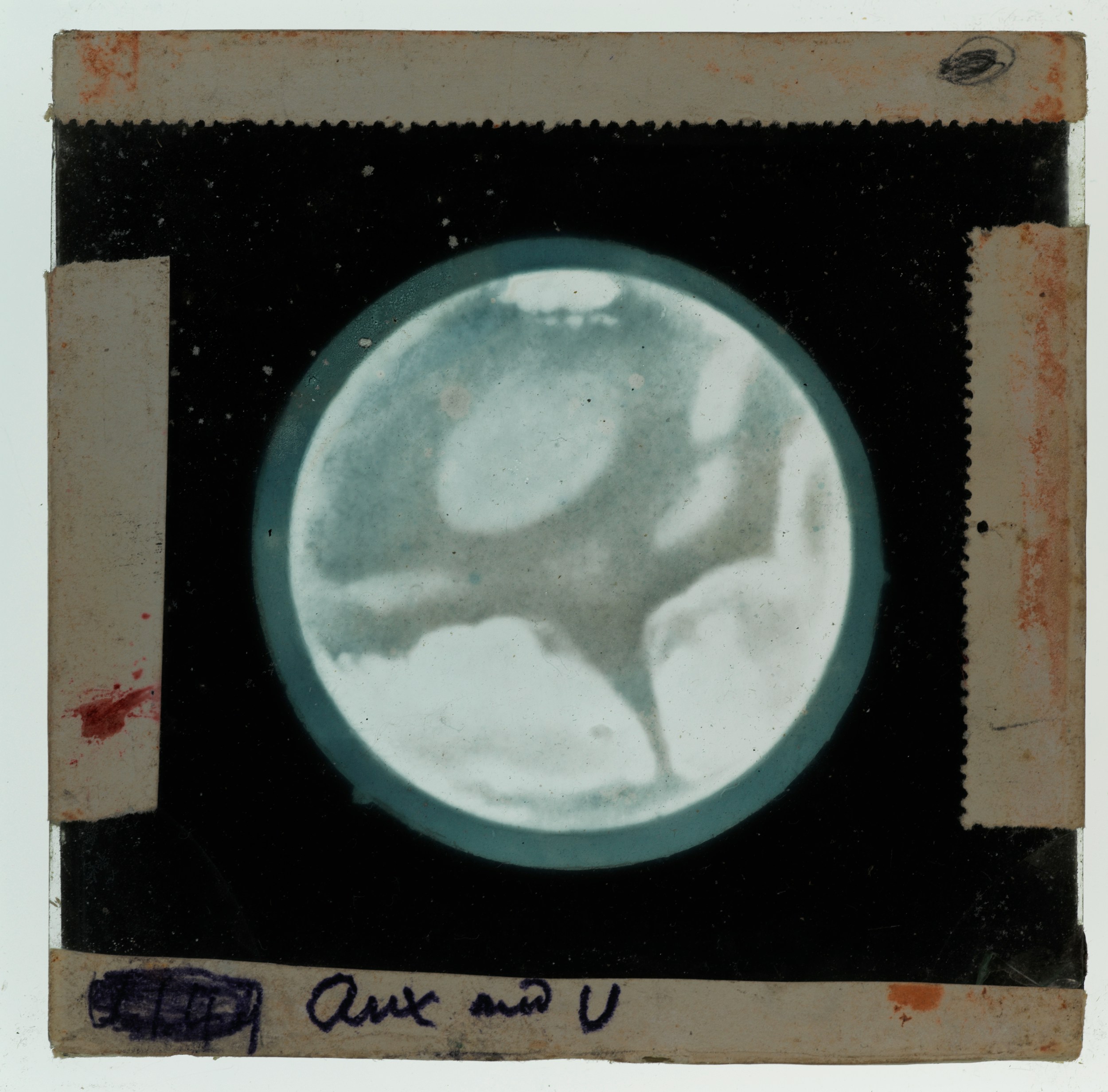A lantern slide produced by Clement Lindley Wragge (b.1852, d.1922), likely dating between 1890-1922. The slide shows a circular image of an unidentified planet with visible land/cloud masses and northern polar ice cap. Shared by Auckland War Memorial Museum, Tāmaki Paenga Hira, as part of the Clement Lindley Wragge collection. 236014|PH-1984-1-LS78-4-7|144. No known copyright restrictions. https://www.aucklandmuseum.com/discover/collections/record/1033202