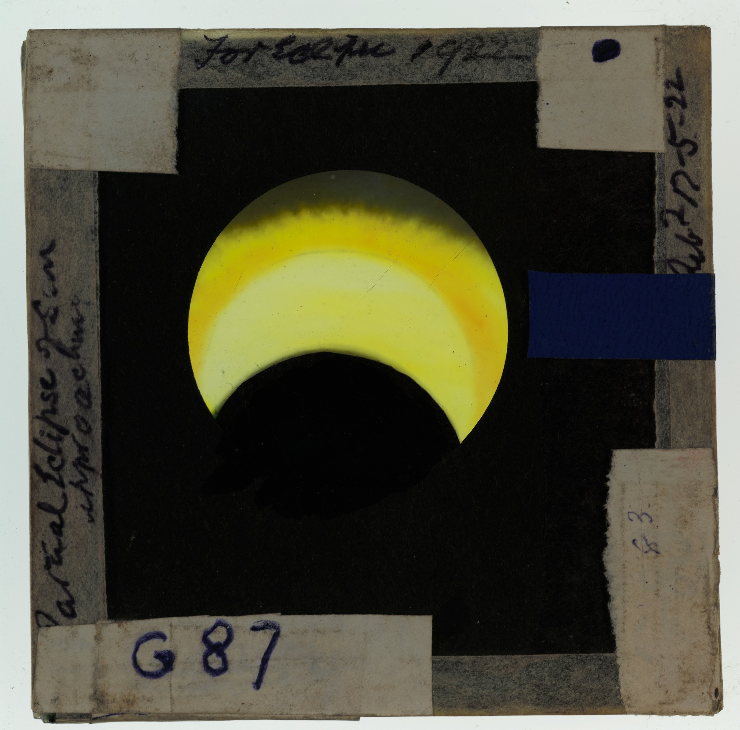 Fragmented Eclipse: A Cyan Yellow Crescent in a Collaged Void