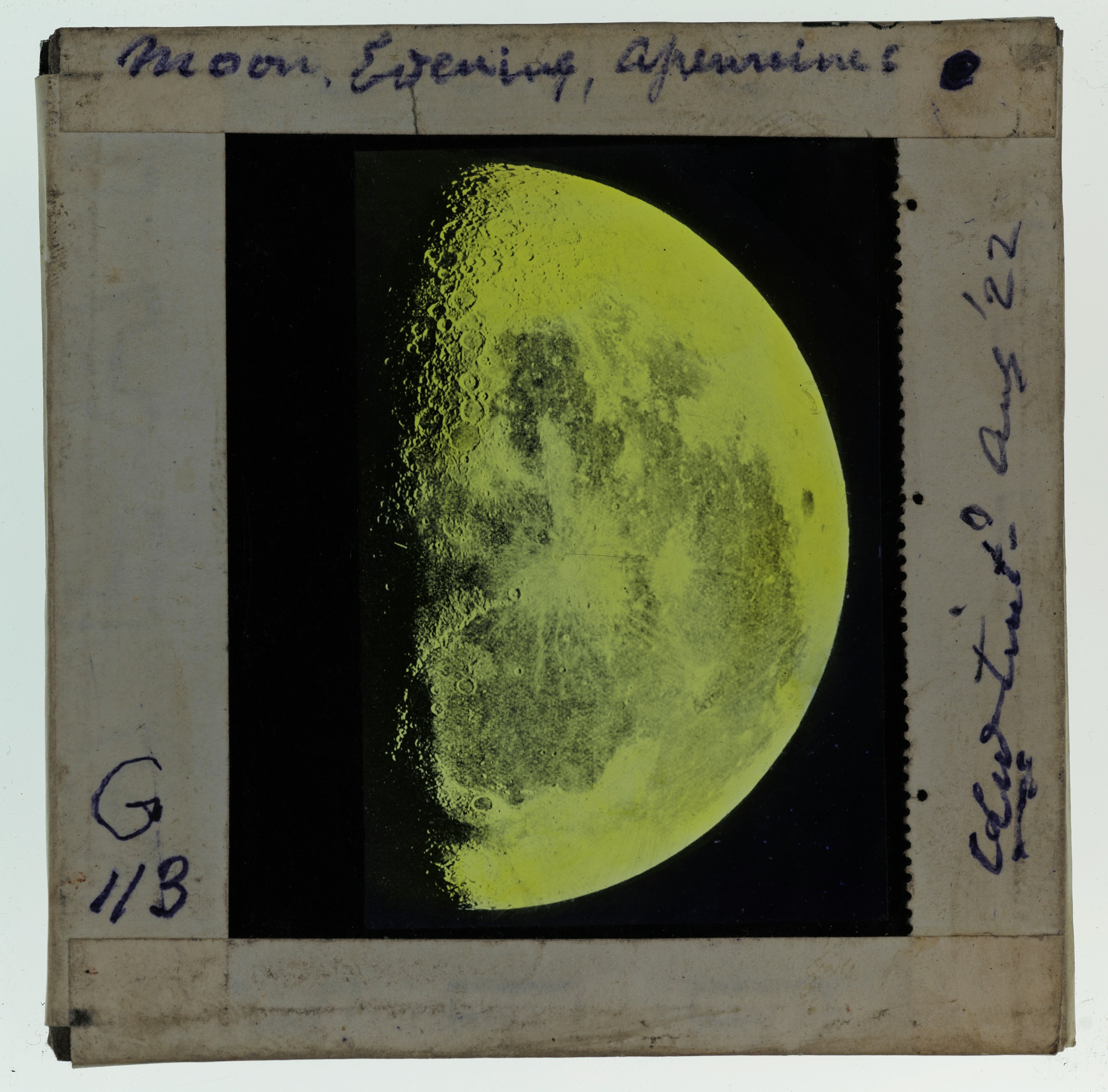 A lantern slide produced by Clement Lindley Wragge (b.1852, d.1922), dated 5 April 1905. The slide shows a yellow/green tinted image of the Moon, with left 1/4 obscured by shadow. Details of craters, lunar maria, and ridges are visible on the surface. Shared by Auckland War Memorial Museum, Tāmaki Paenga Hira, as part of the Clement Lindley Wragge collection. 235975|PH-1984-1-LS78-3-46|113. No known copyright restrictions. https://www.aucklandmuseum.com/discover/collections/record/1033240