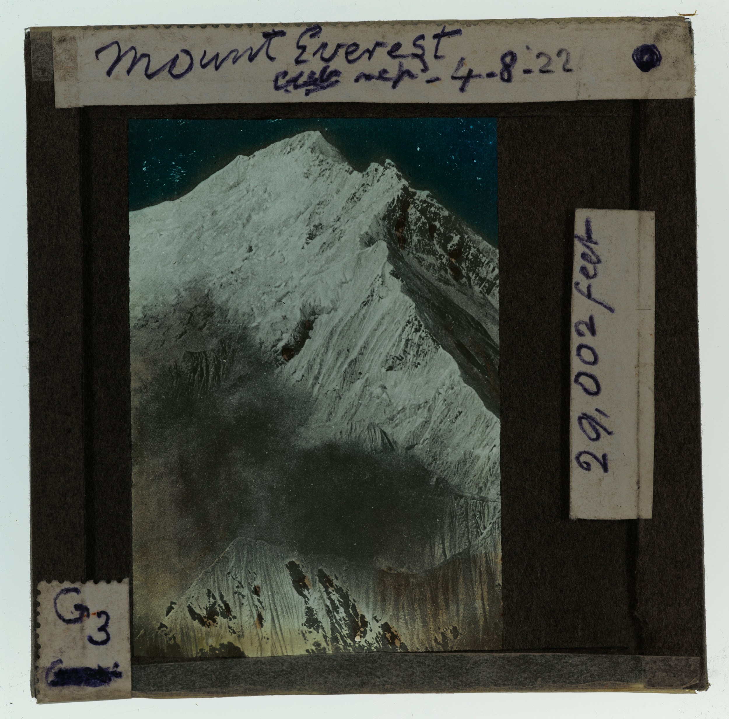 A lantern slide produced by Clement Lindley Wragge (b.1852, d.1922), date unknown. This lantern slide depicts the peak of Mount Everest with a starry sky visible above. Shared by Auckland War Memorial Museum, Tāmaki Paenga Hira, as part of the Clement Lindley Wragge collection. 235968|PH-1984-1-LS78-3-39|3. No known copyright restrictions. https://www.aucklandmuseum.com/discover/collections/record/1033247
