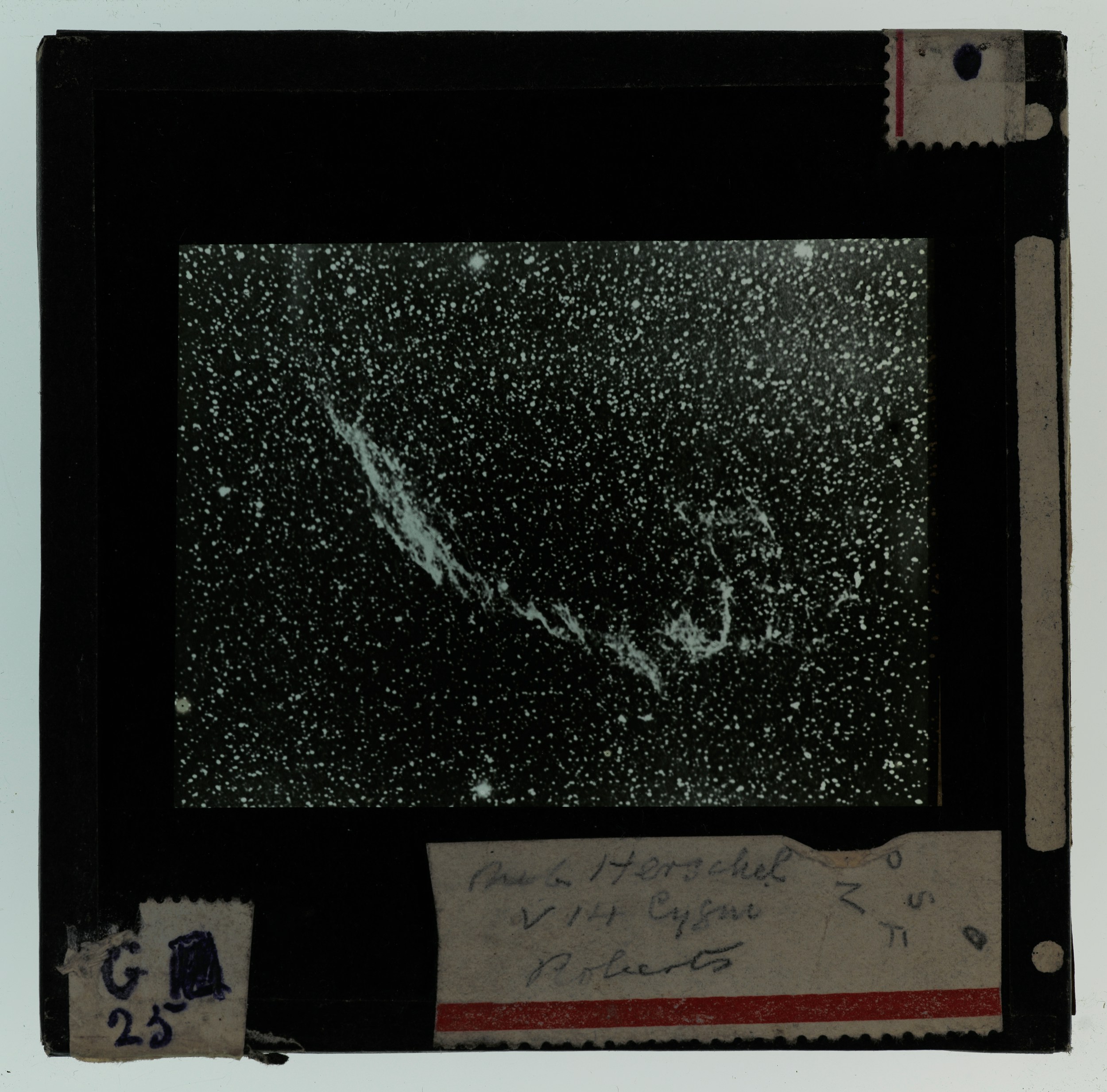 A lantern slide produced by Clement Lindley Wragge (b.1852, d.1922), likely dating between 1890-1922. The slide shows image of crescent shaped star cluster in the midst of other stars. Shared by Auckland War Memorial Museum, Tāmaki Paenga Hira, as part of the Clement Lindley Wragge collection. 235960|PH-1984-1-LS78-3-31|25. No known copyright restrictions. https://www.aucklandmuseum.com/discover/collections/record/1033255