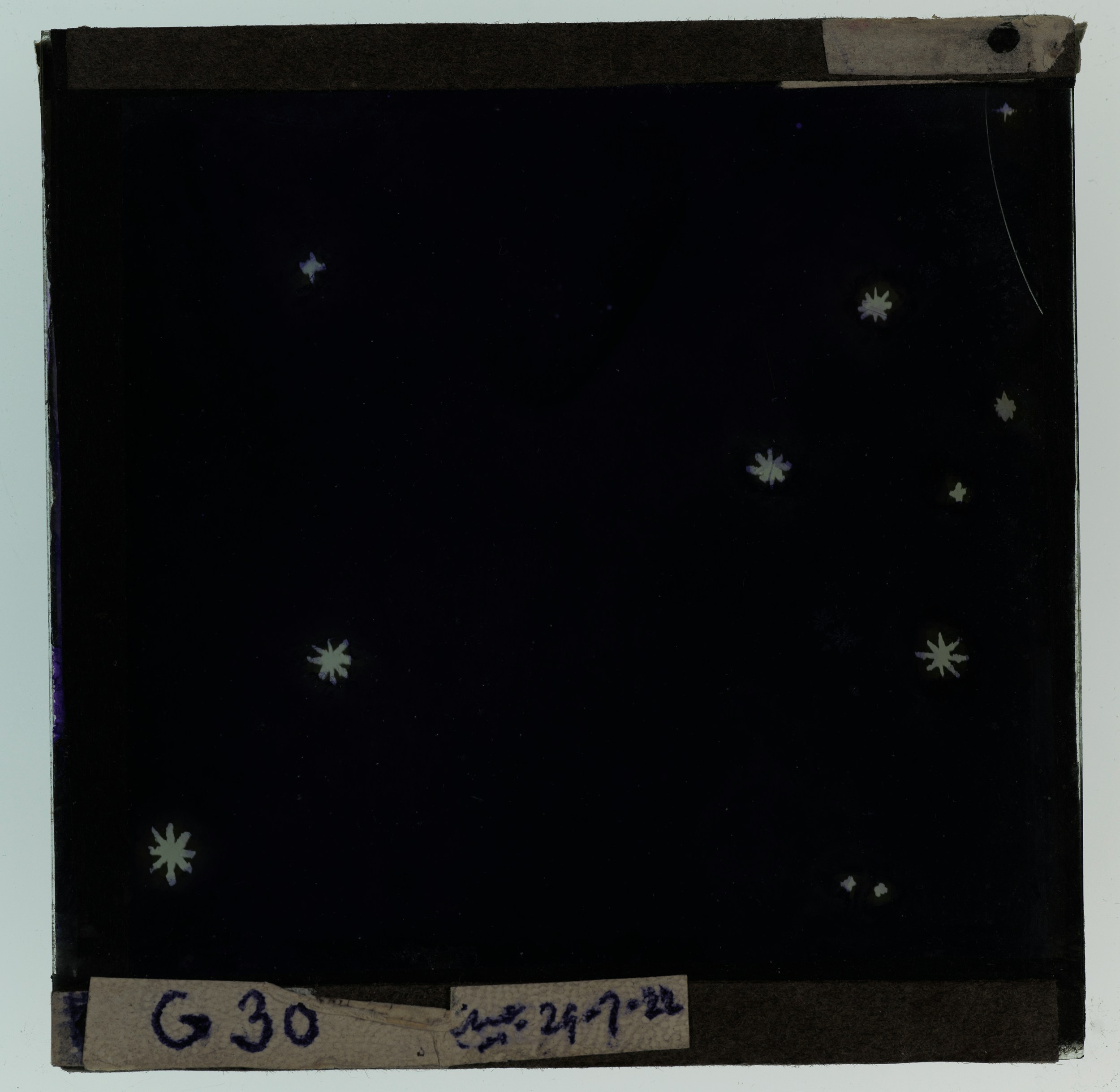 A lantern slide produced by Clement Lindley Wragge (b.1852, d.1922), date unknown.The slide shows an illustration of 11 stars on a black background. Shared by Auckland War Memorial Museum, Tāmaki Paenga Hira, as part of the Clement Lindley Wragge collection. 235945|PH-1984-1-LS78-3-16|30. No known copyright restrictions. https://www.aucklandmuseum.com/discover/collections/record/1033270