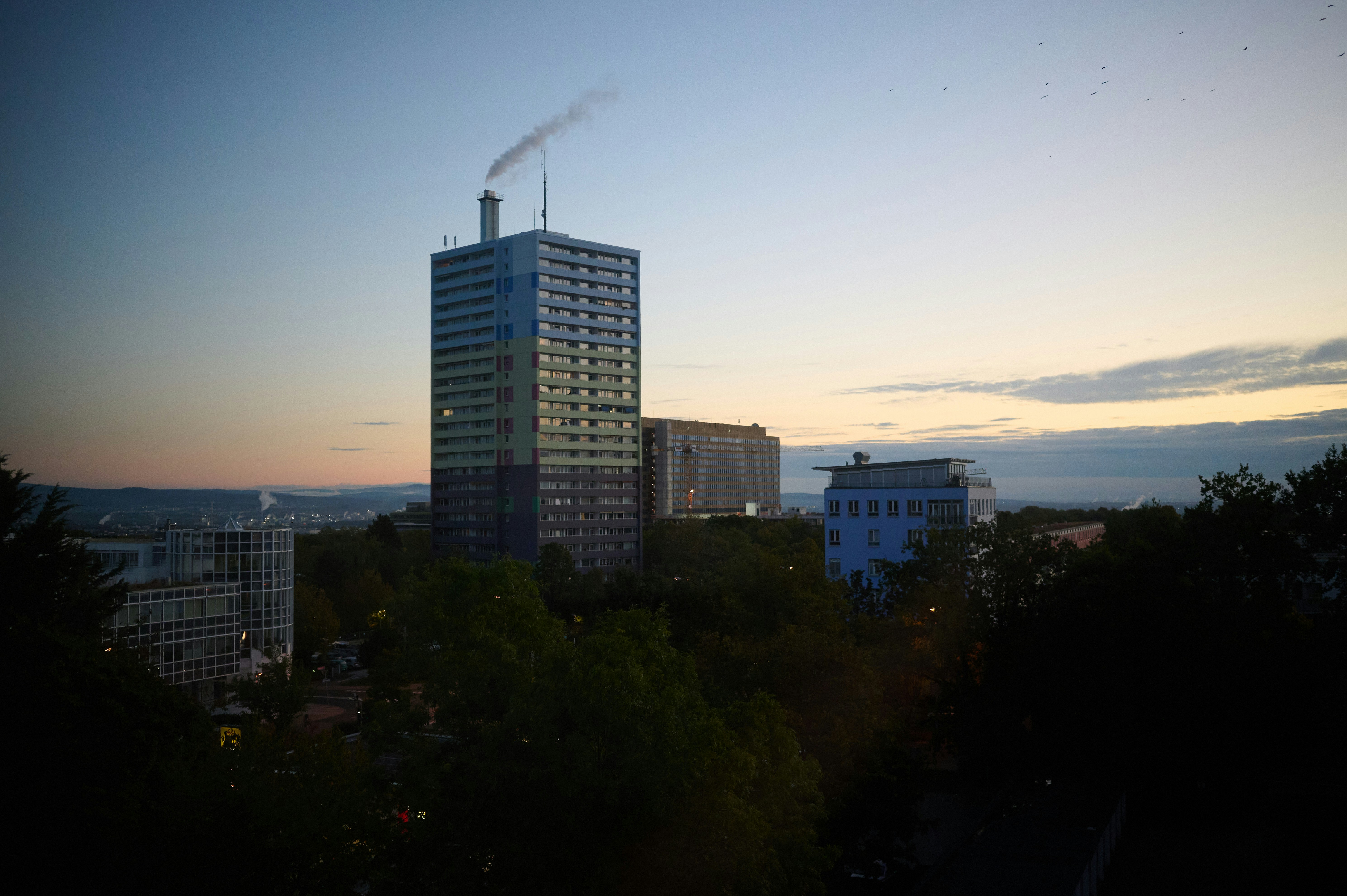 Dusk Over the City: The Tall Tower and Quiet Skyline