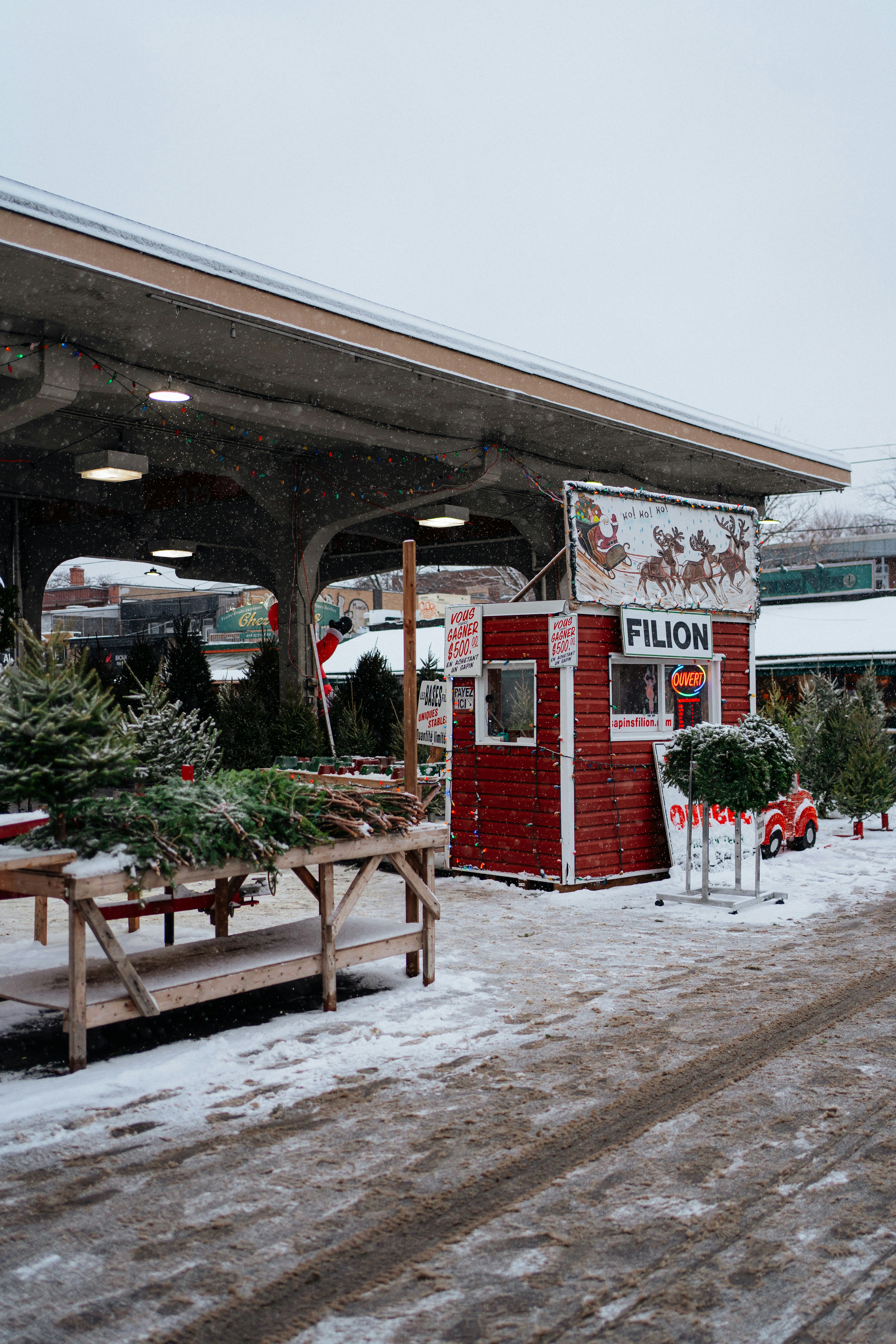 Snowy Market Stand in a Wooden Pavilion