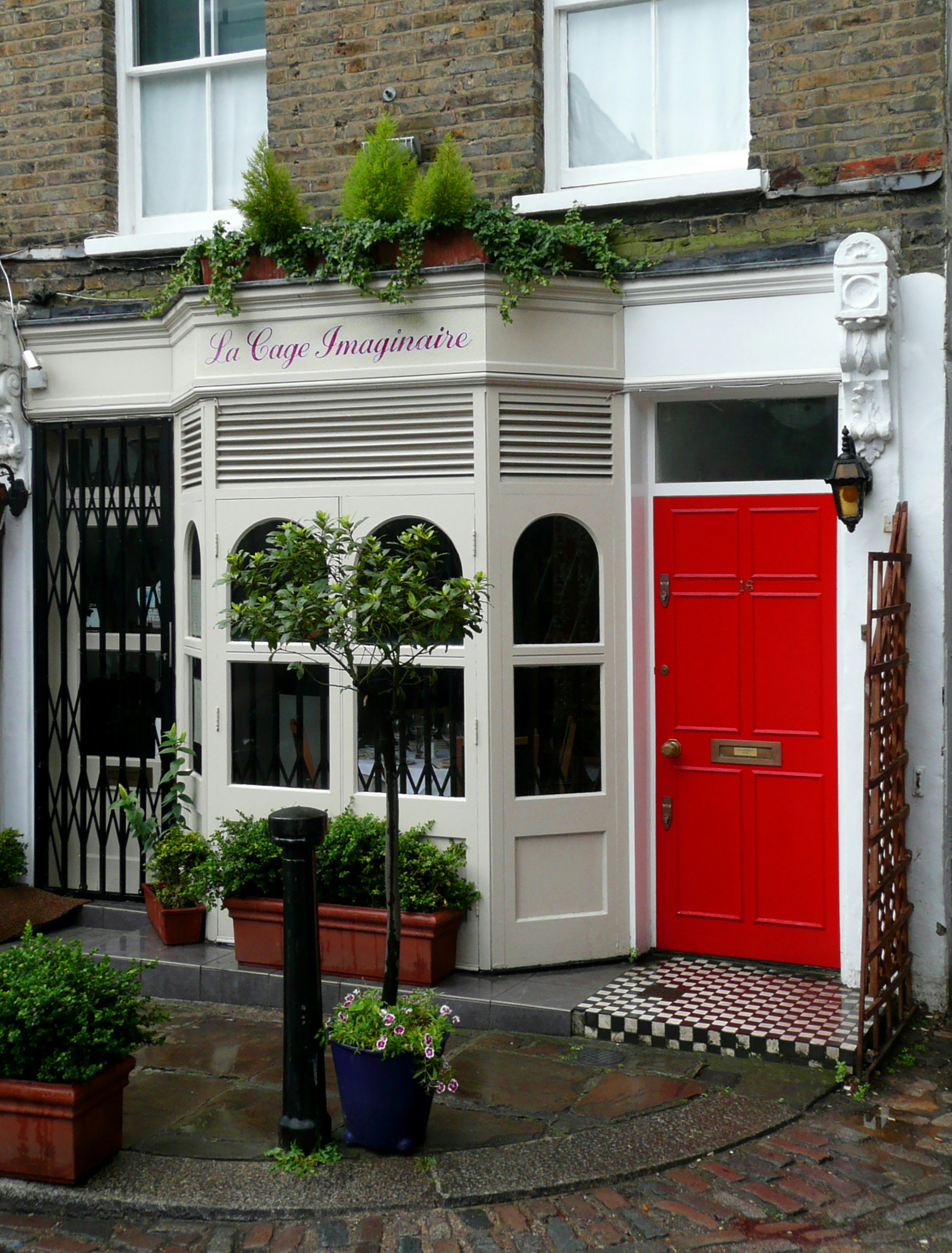 Whimsical Streetfront: The Red Door and Glass-Front Café
