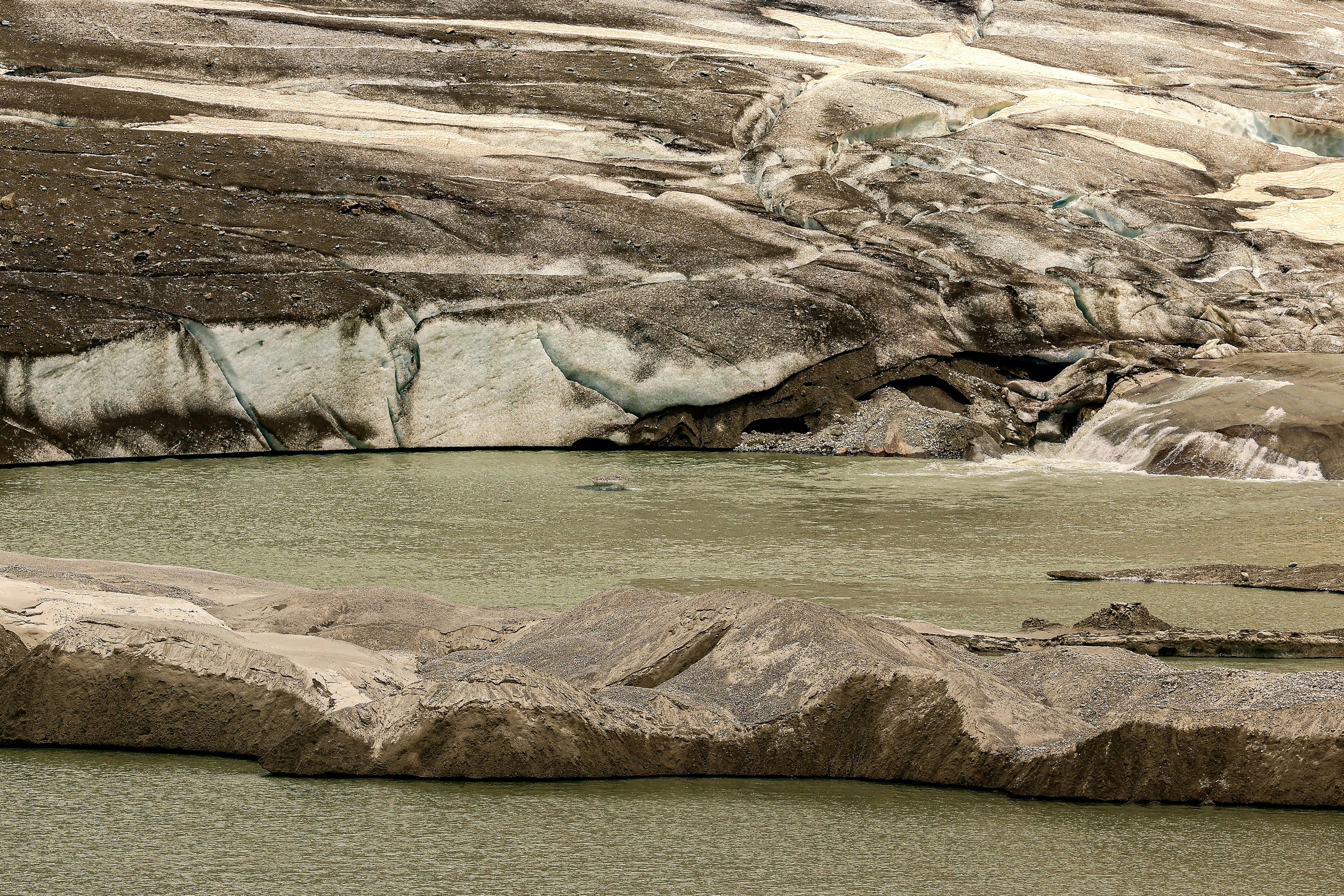 Stone Steps and Quiet Silt: A Serene Riverbank Portrait