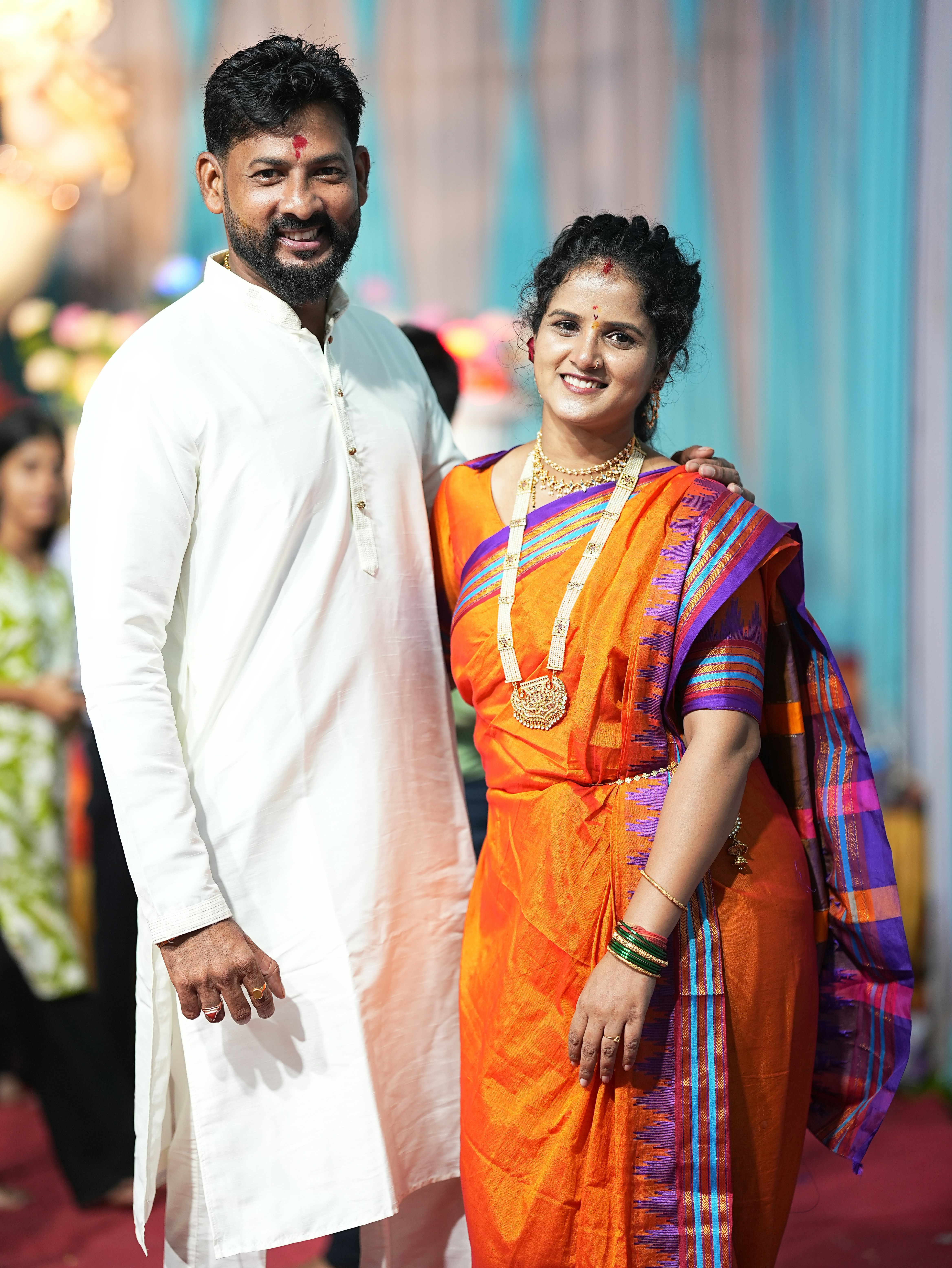 Joyful Tandem: A festive portrait in orange and white