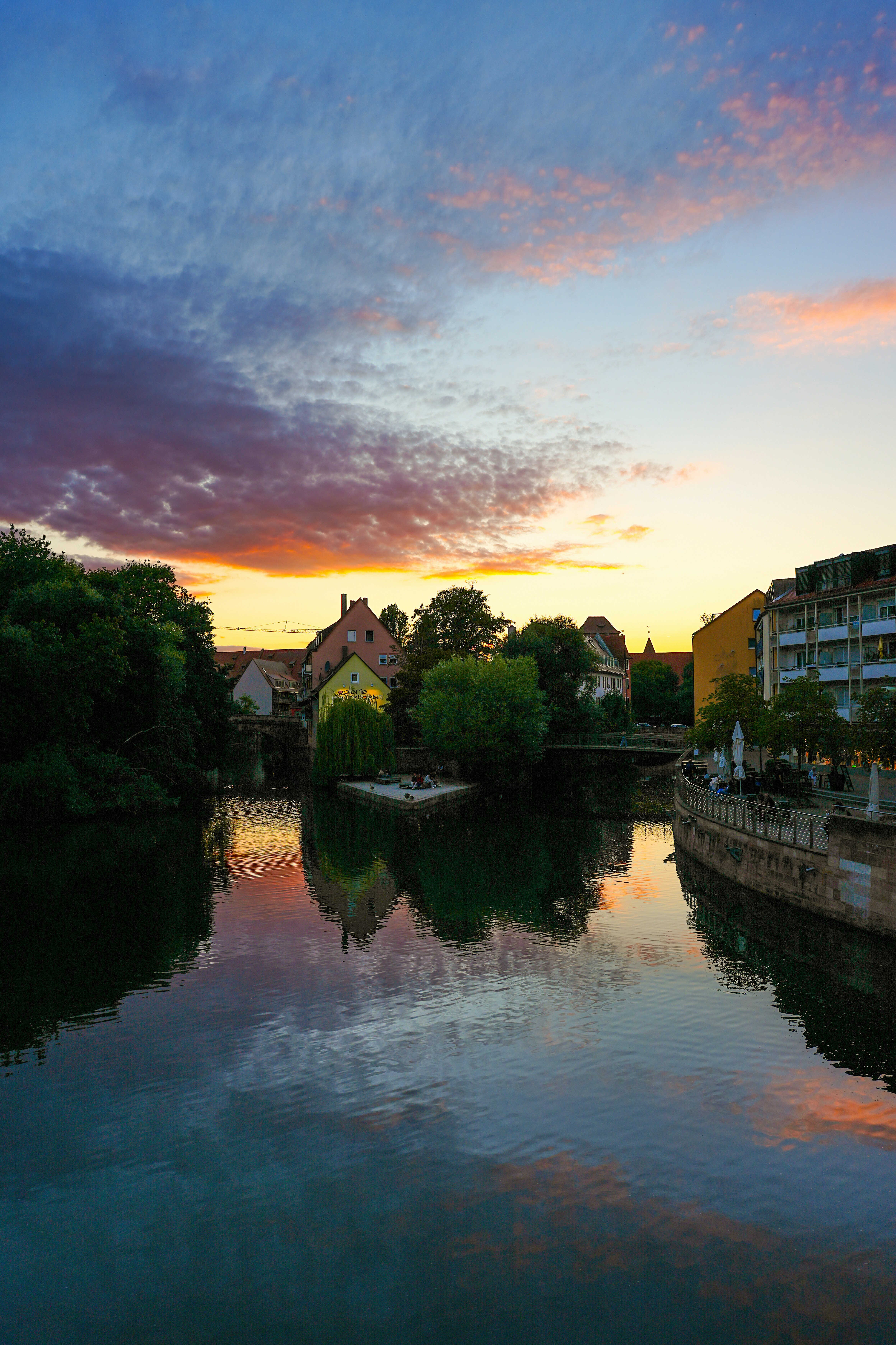Sunset Over the Canal: Reflections and Quiet City Edge