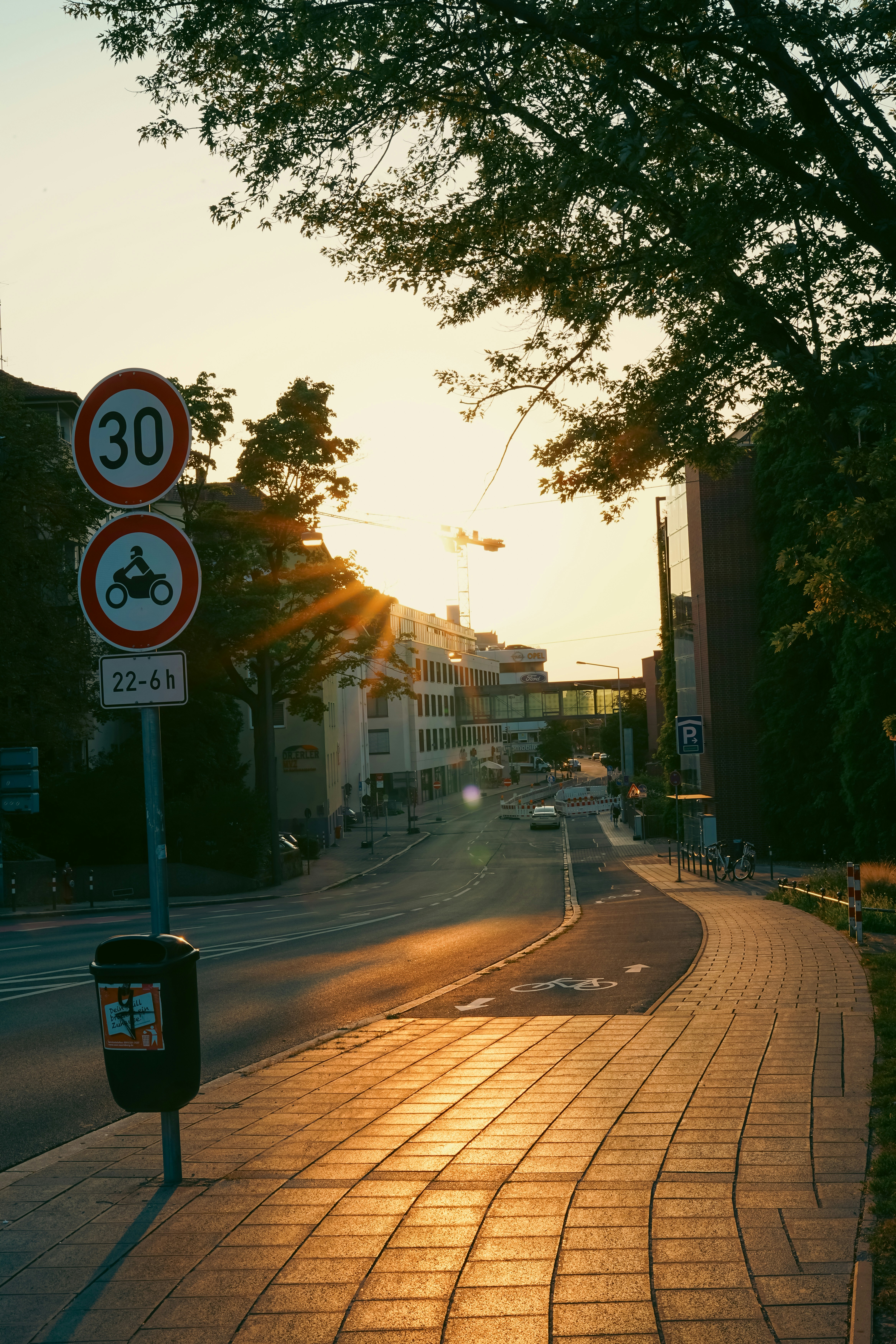 Golden Hour Cascade: Sunlight Strikes a Quiet Urban Street