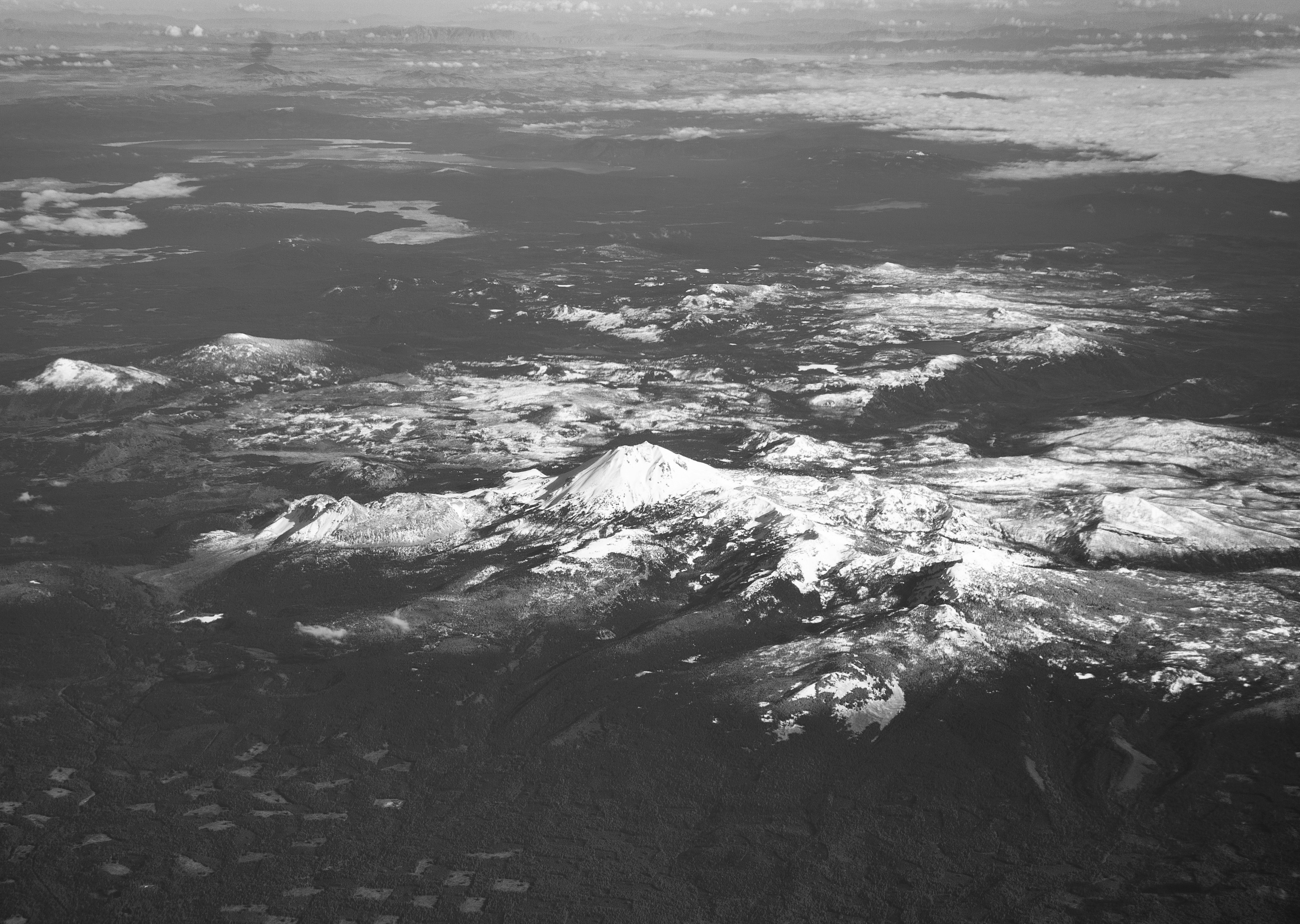 Snow-Glazed High Ridge from a Far Sky