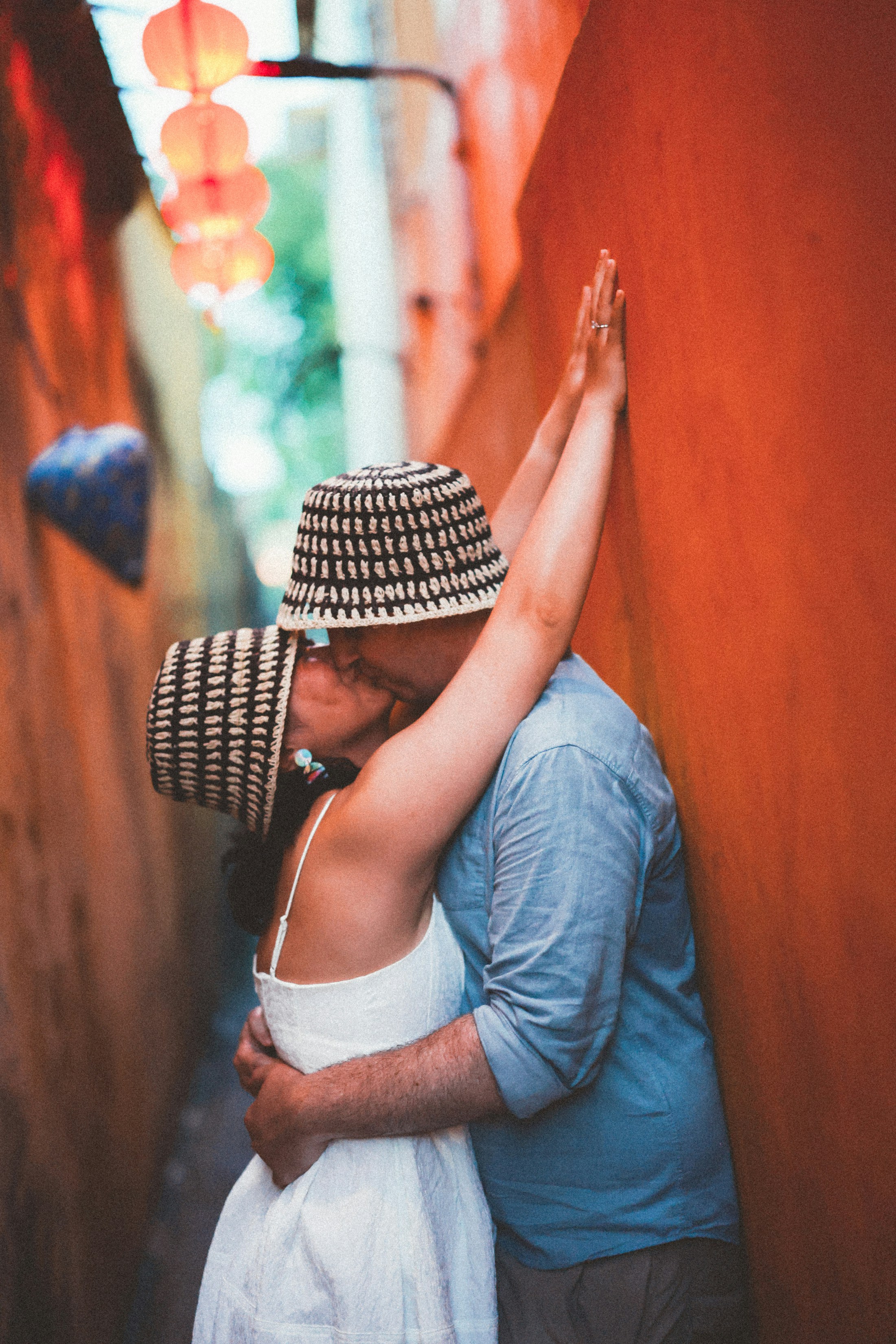 Close Embrace Between lovers in a vibrant alley