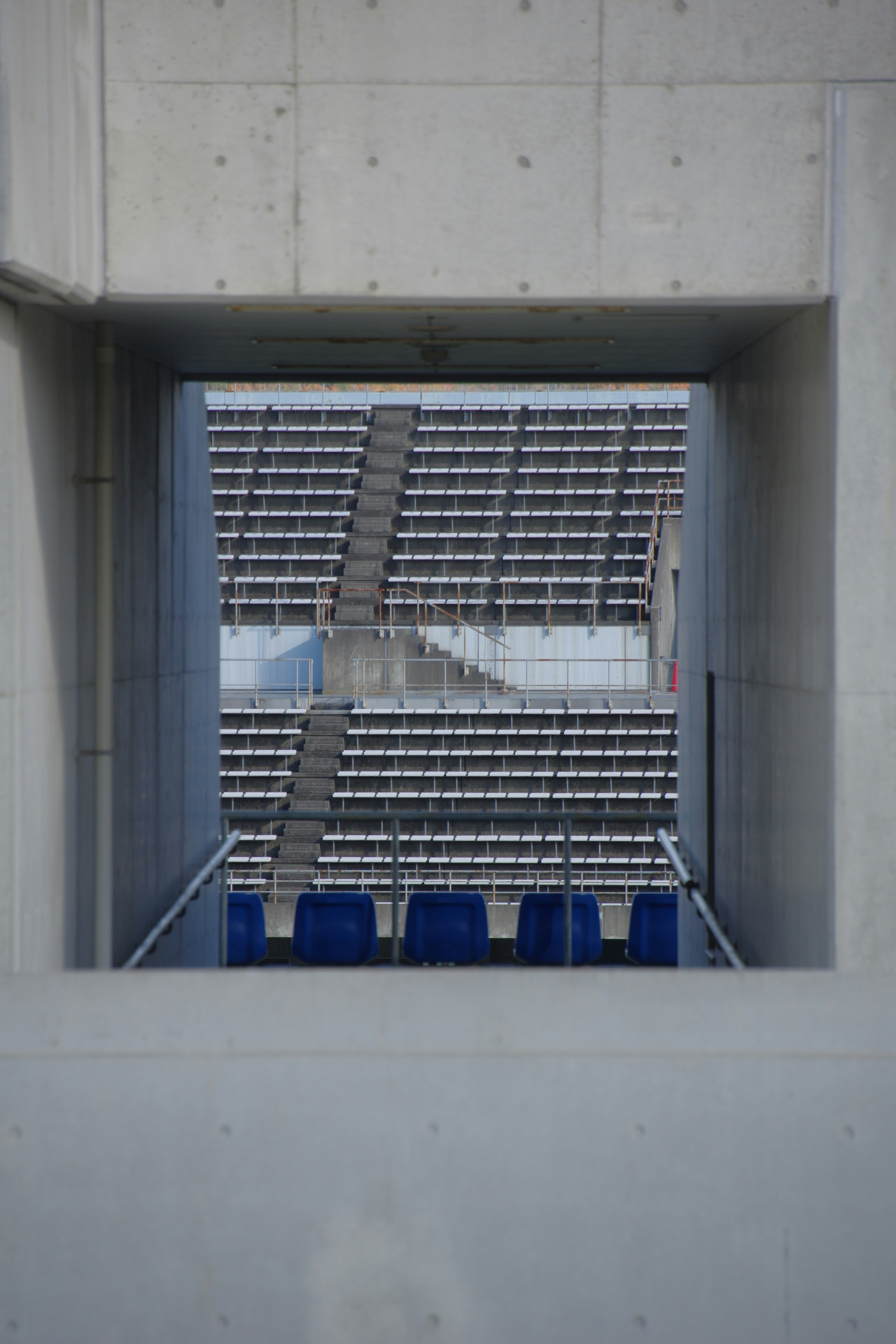 Framed Arena: A Stadium Corridor Piercing the Concrete