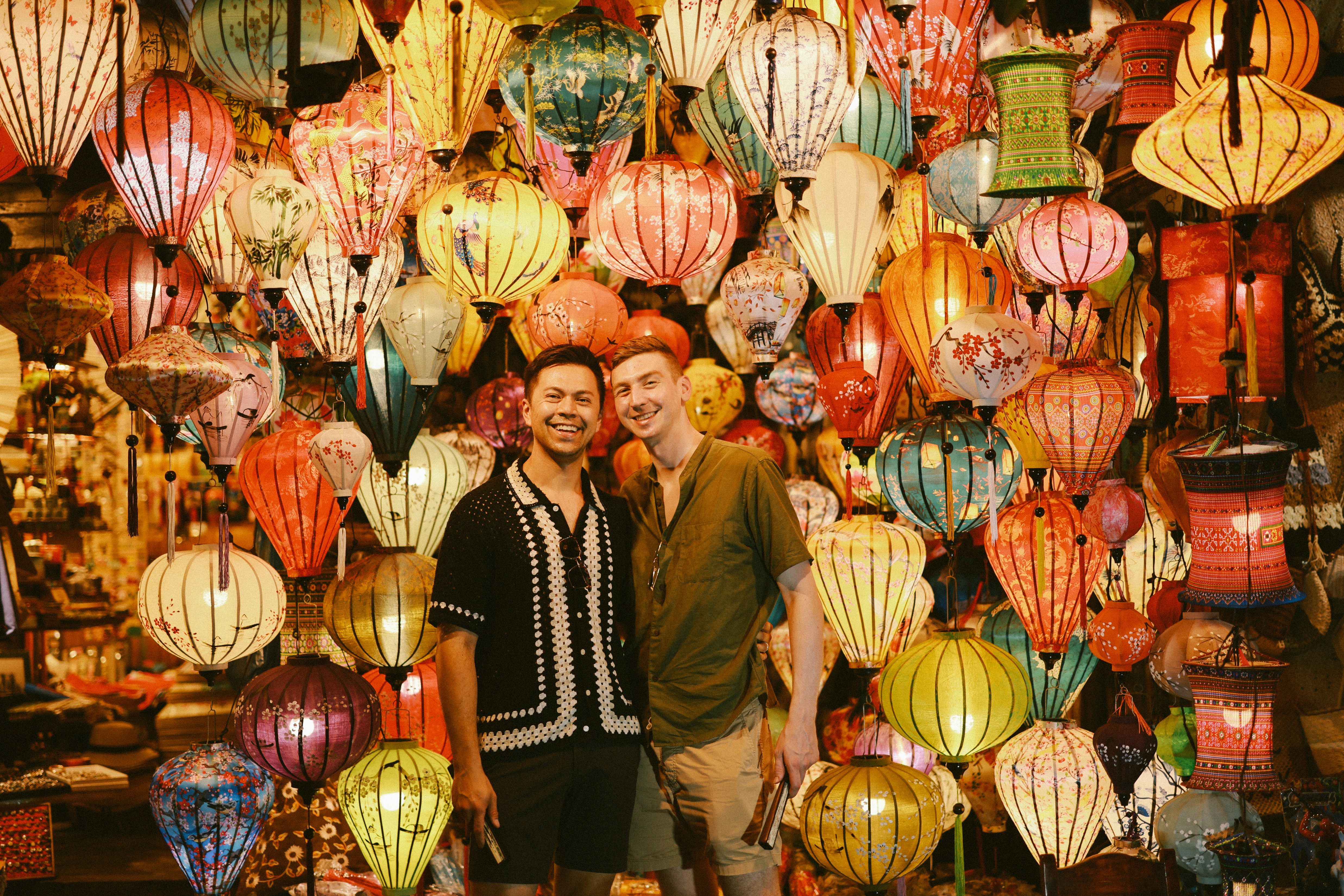 Lanterns and Laughter: Friends Amidst a Sea of Orbs