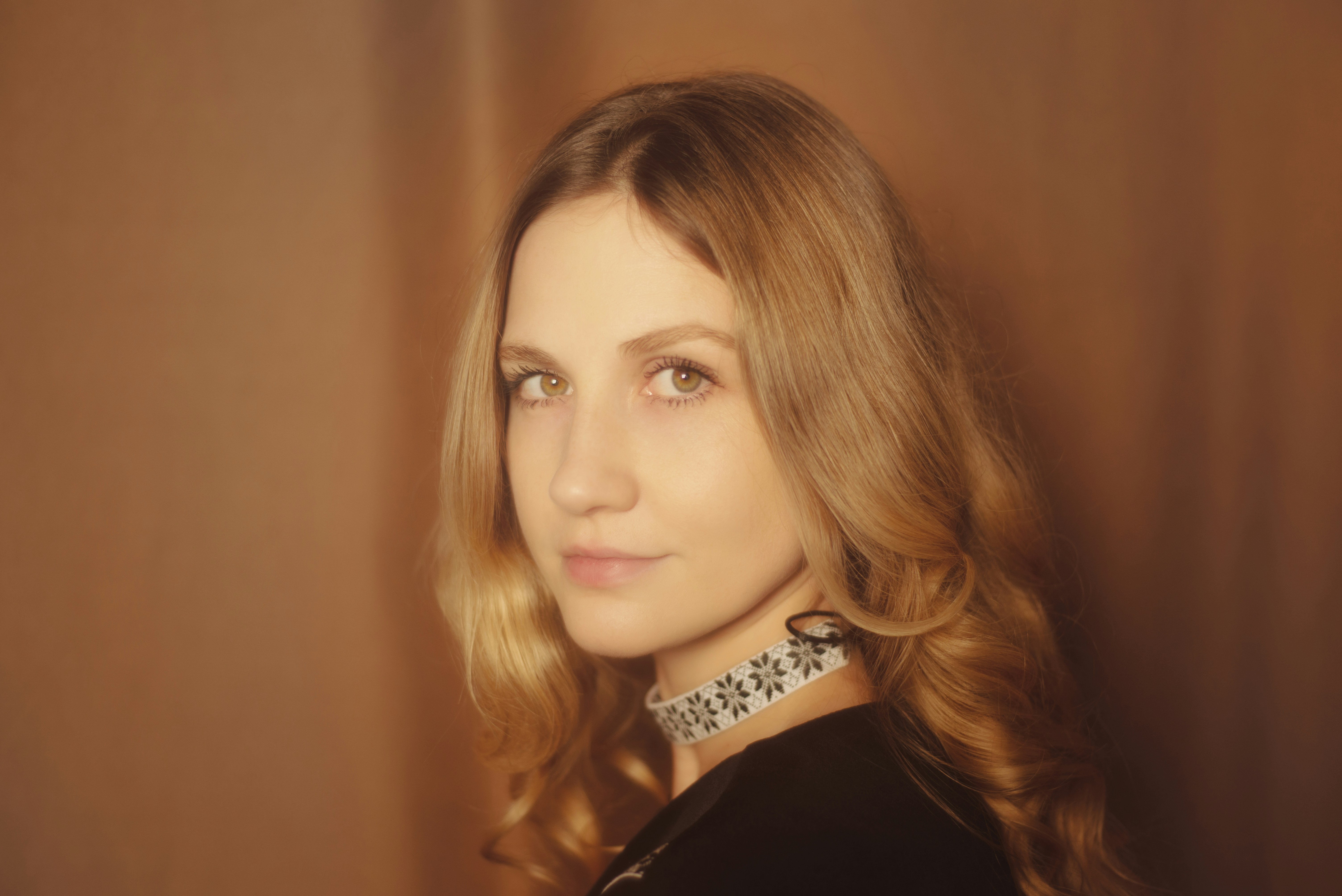 Soft Amber Portrait: A Quiet Moment with Warm Light