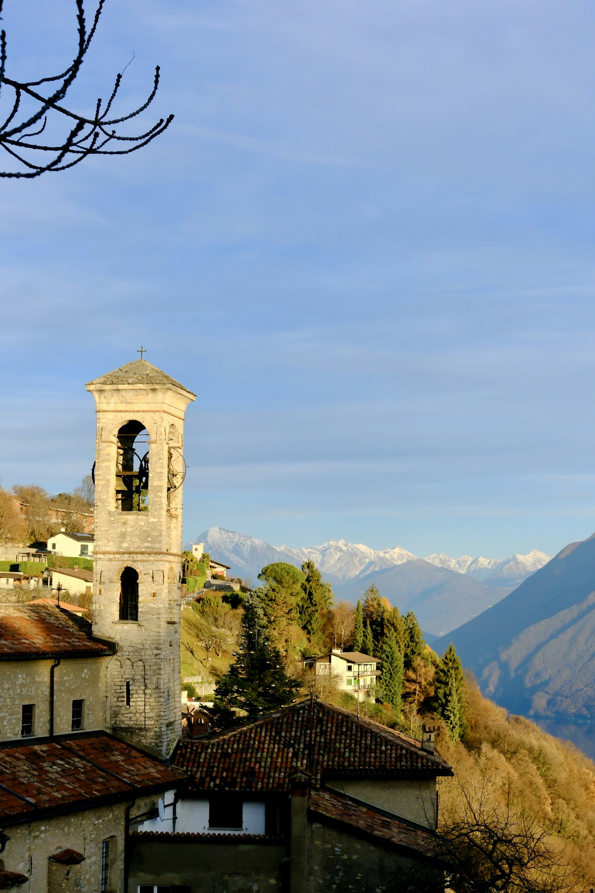 Bell Tower Over Alpine Village at Dusk