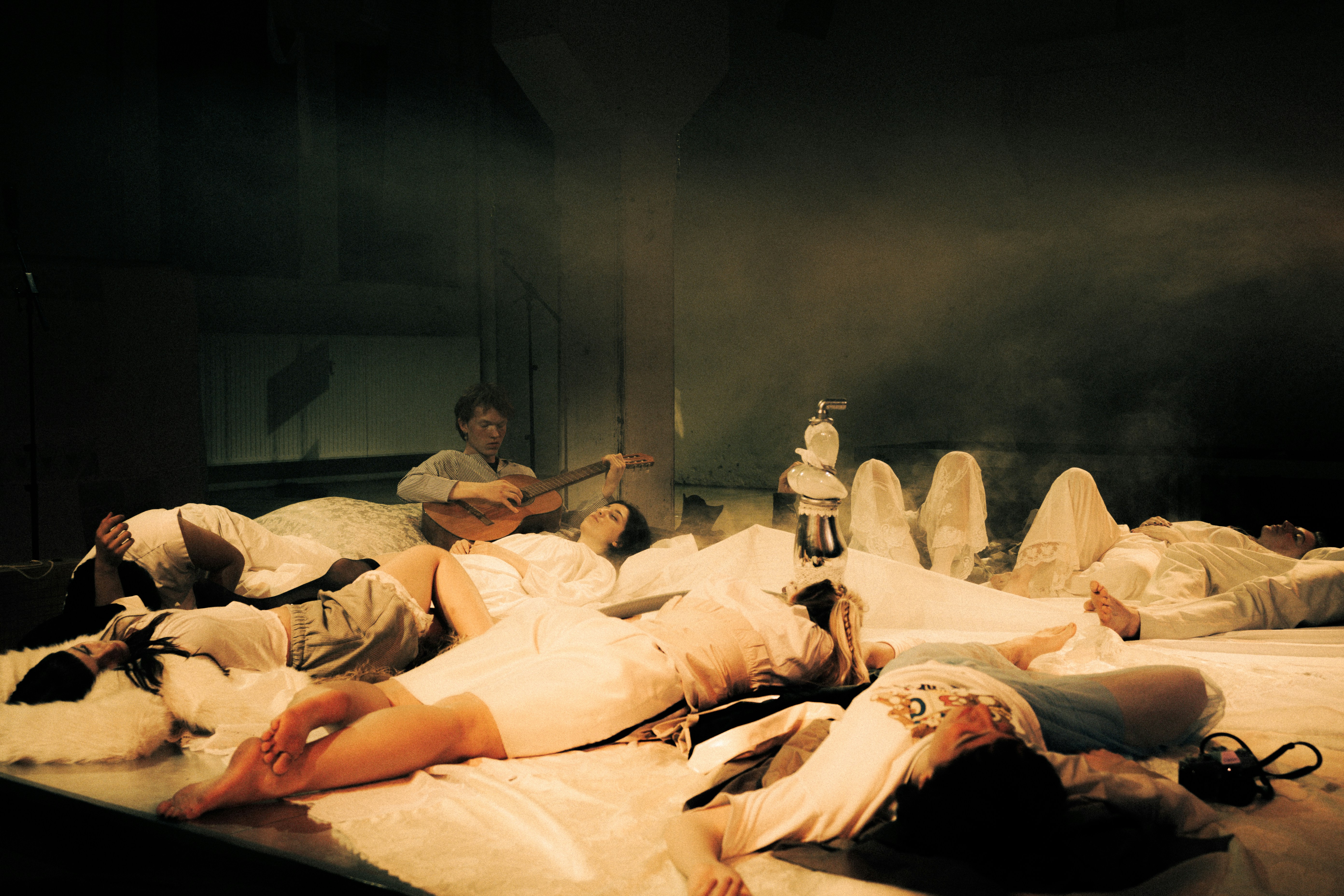 Echoes of a Quiet Stage: Bodies in White and a Strummed Solace
