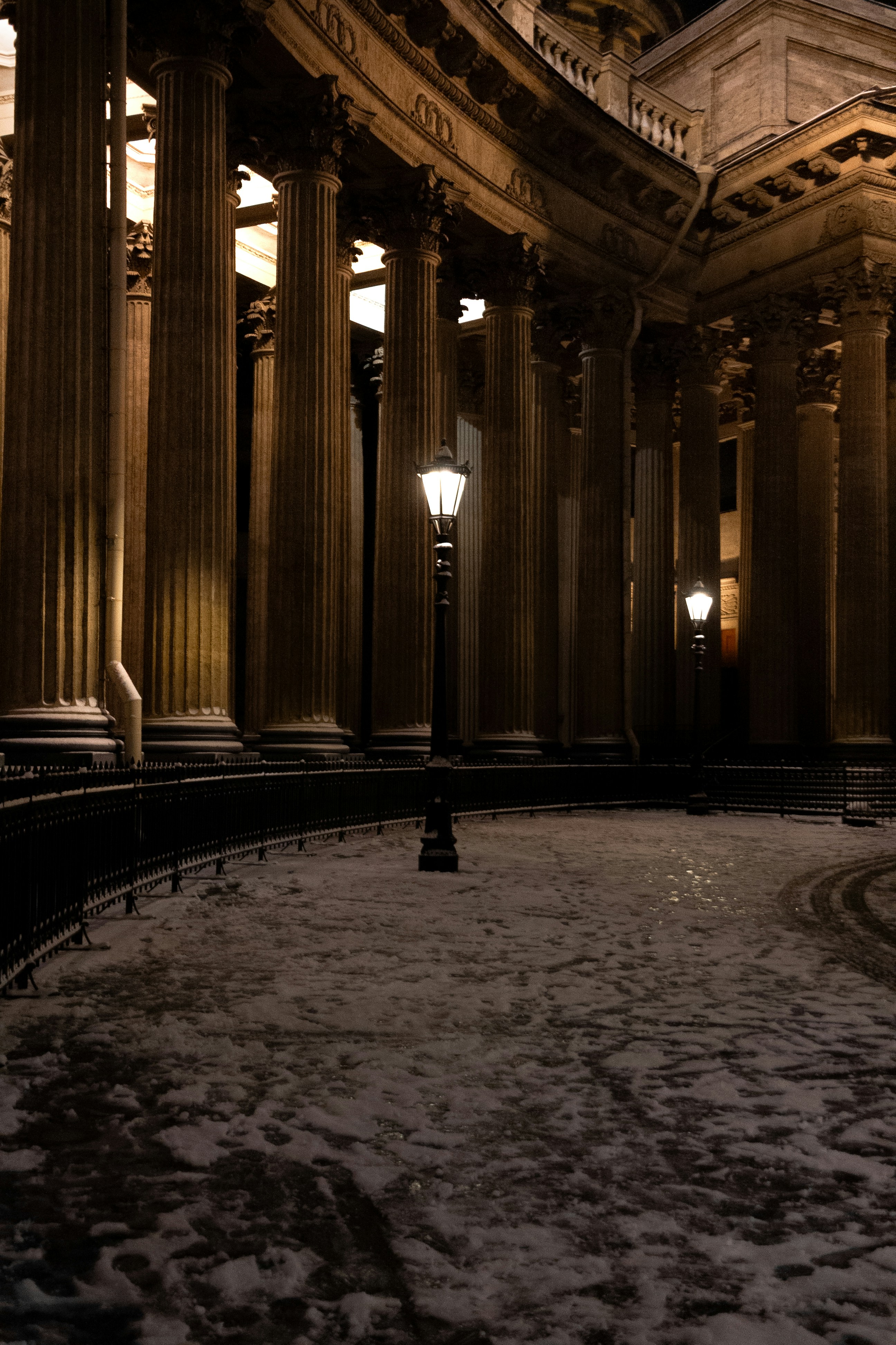 Lamplight Among the Colonnades: Night at the City Hall