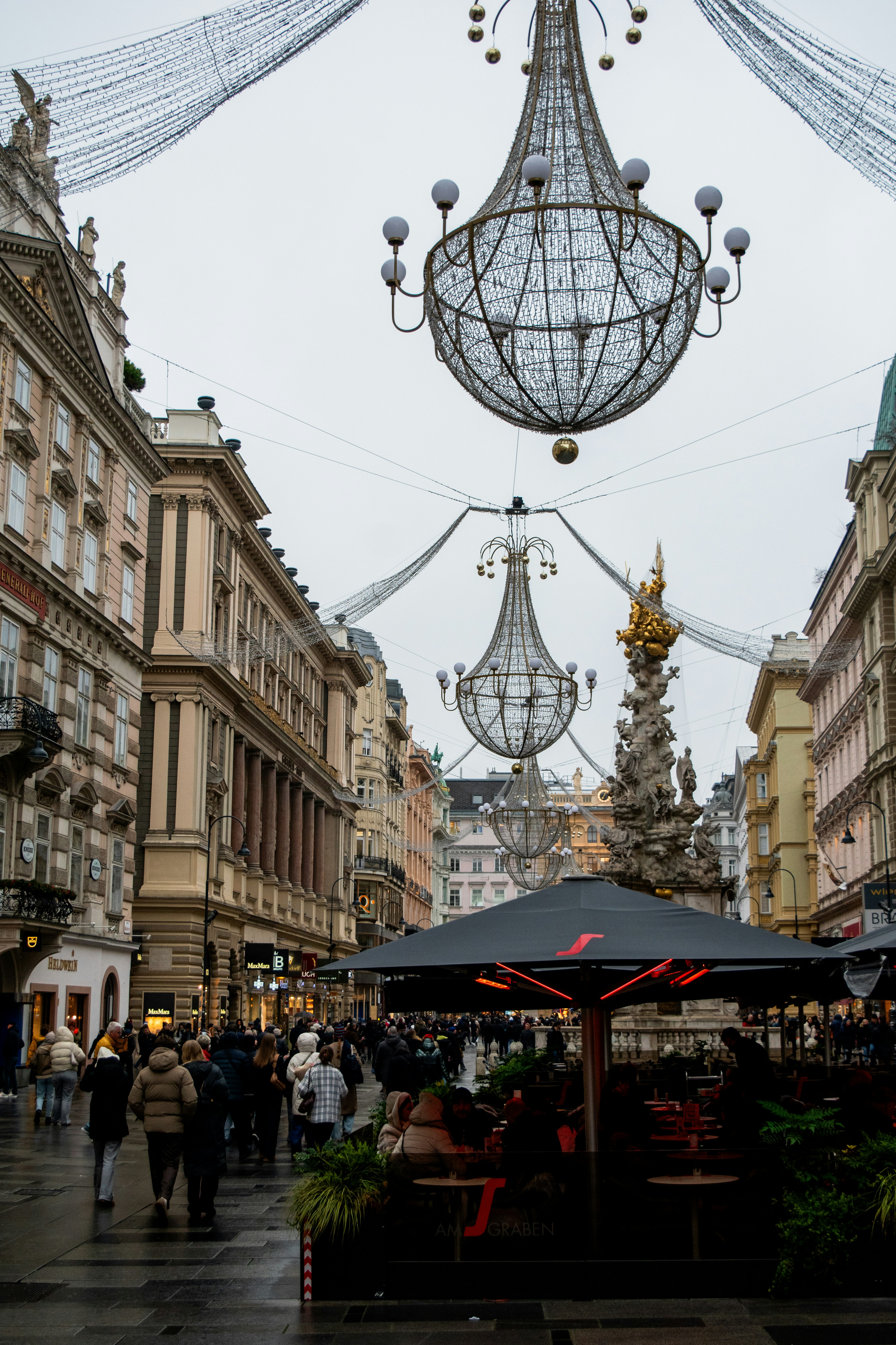 Charmed City Square Under Festive Orbs