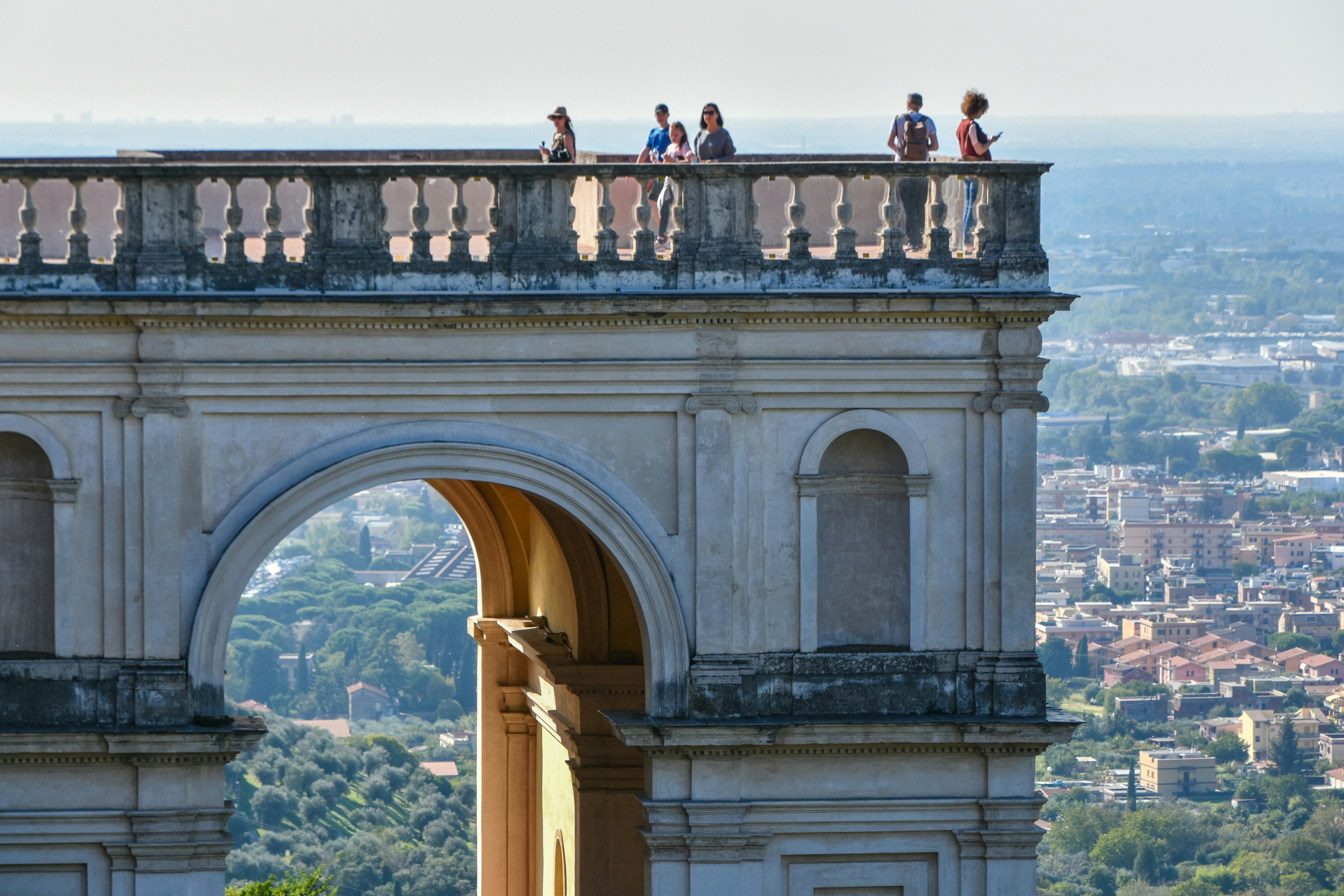 The Terrace Overlook: Travelers at the Arch