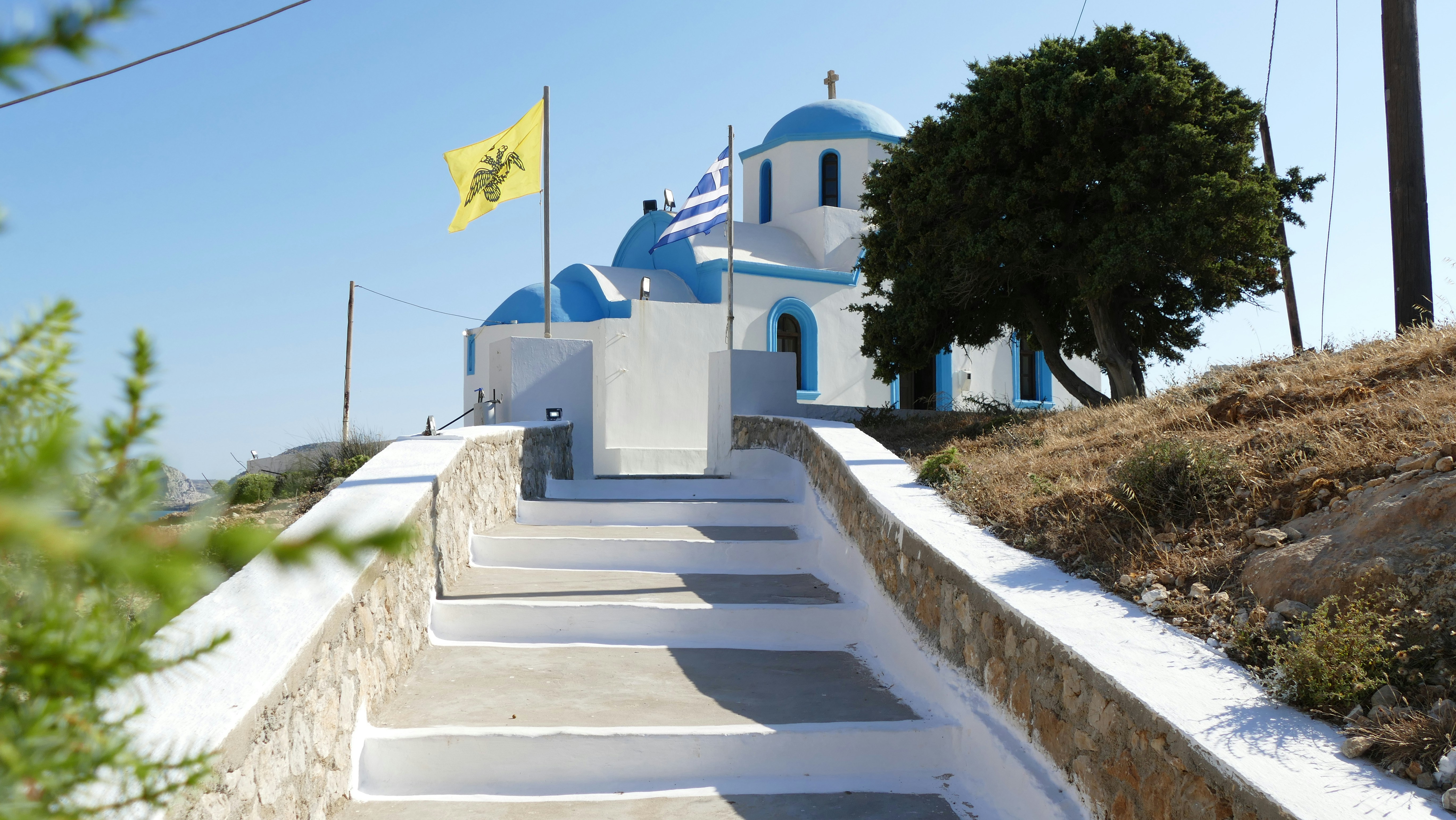 Stairway to a typical Karpathos church in summer