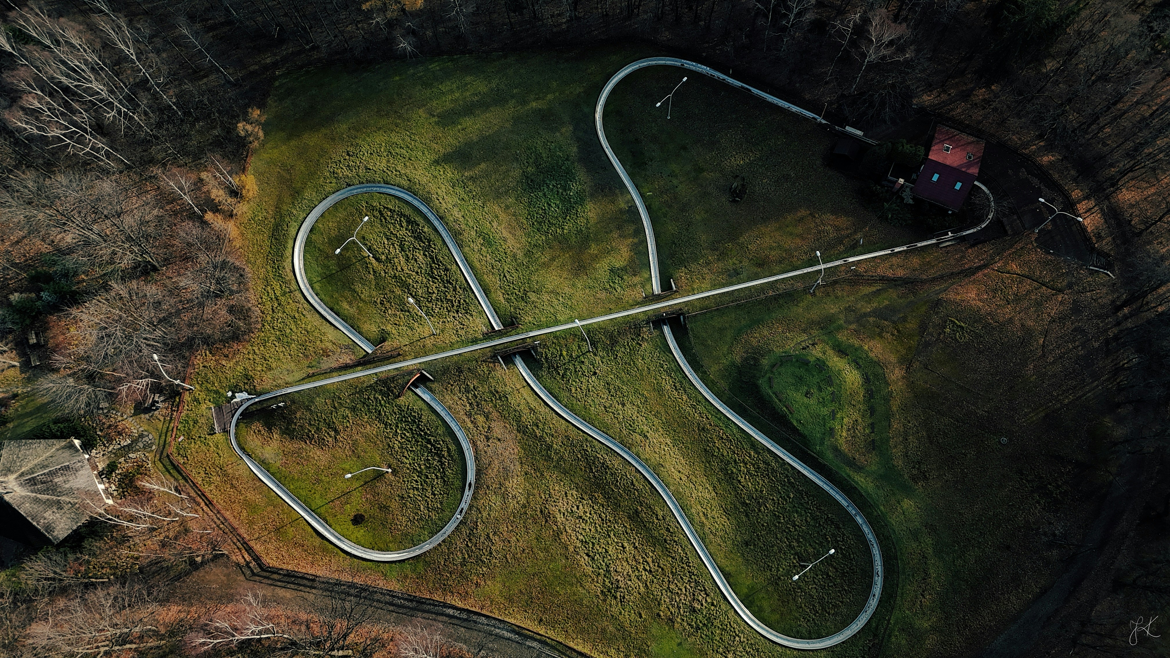 Serpentine Trackway: Aerial Glimpse into a Curved Landscape
