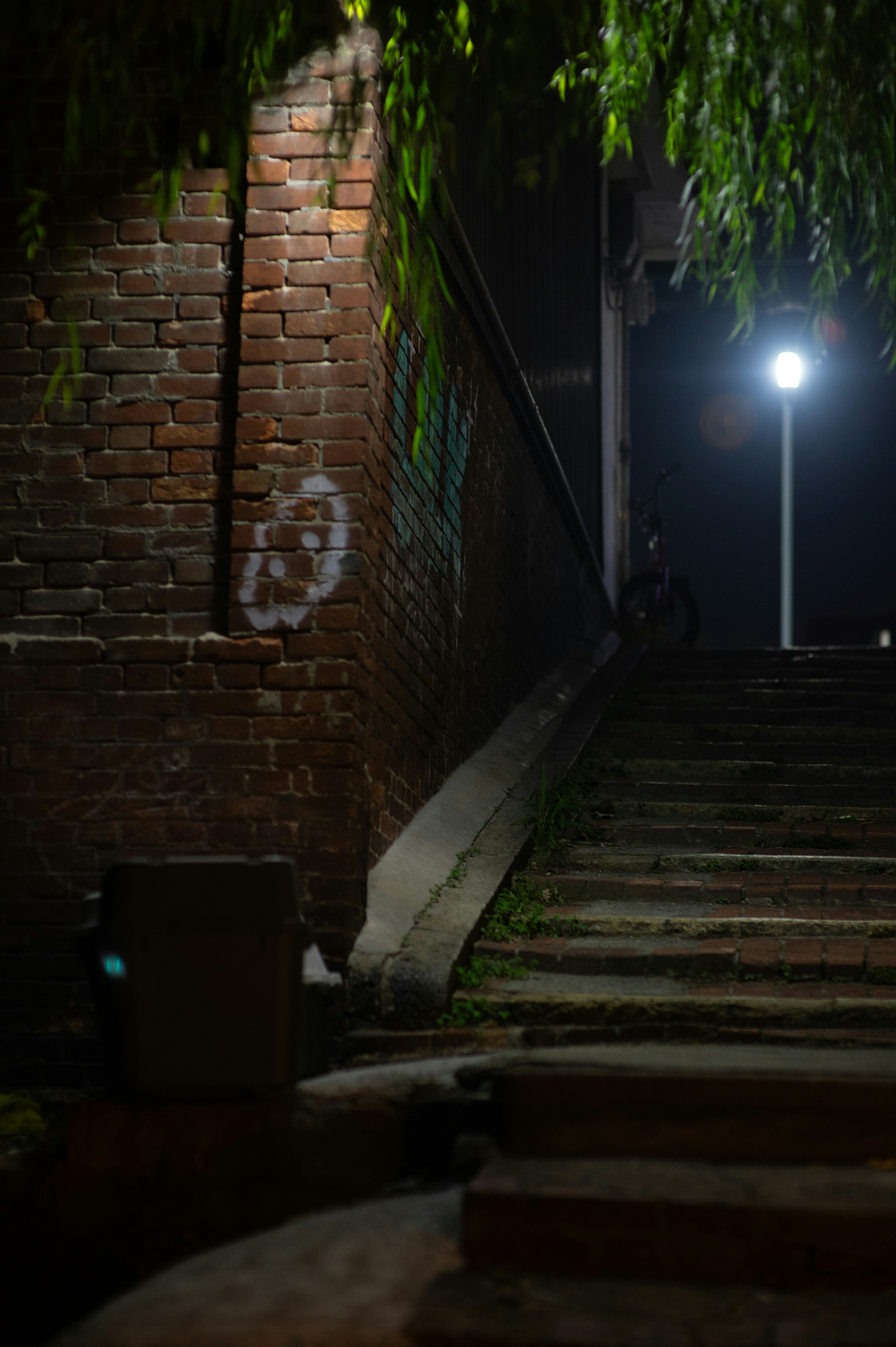 Quiet Power of Night Stairs by the Brick Wall